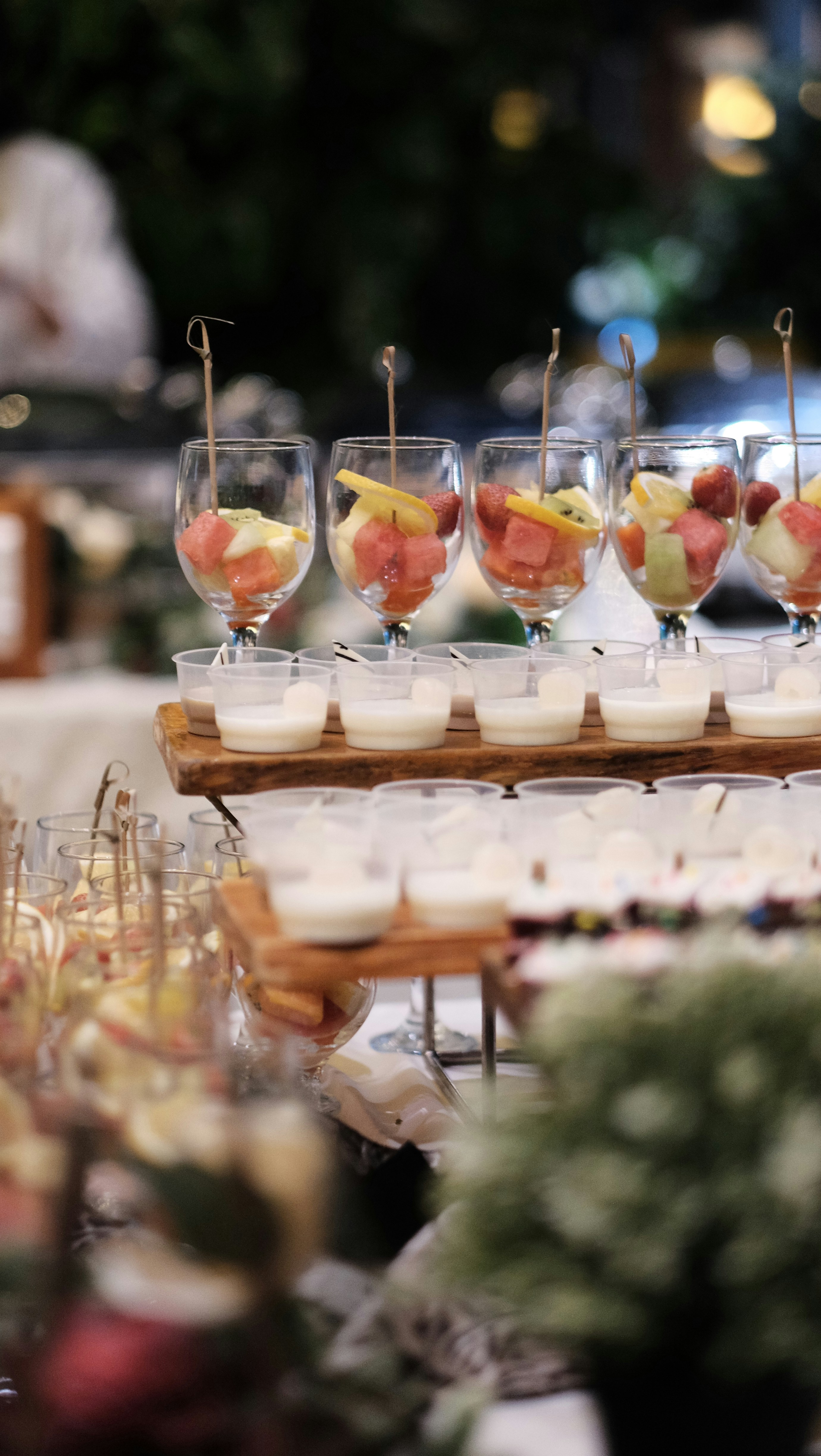 a group of glasses with liquid in them