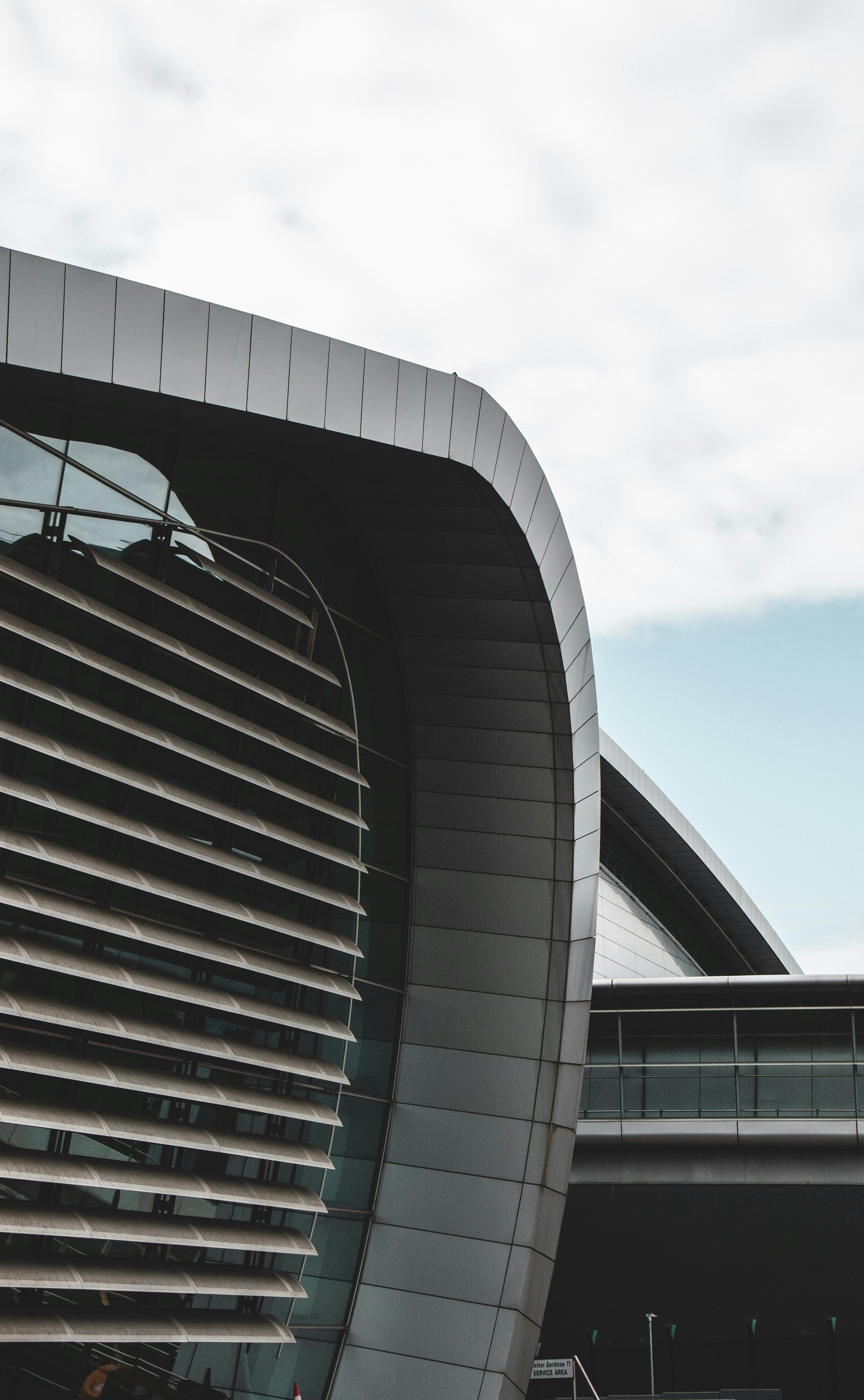 A tall building with a curved top photo – Free Dublin airport (dub ...