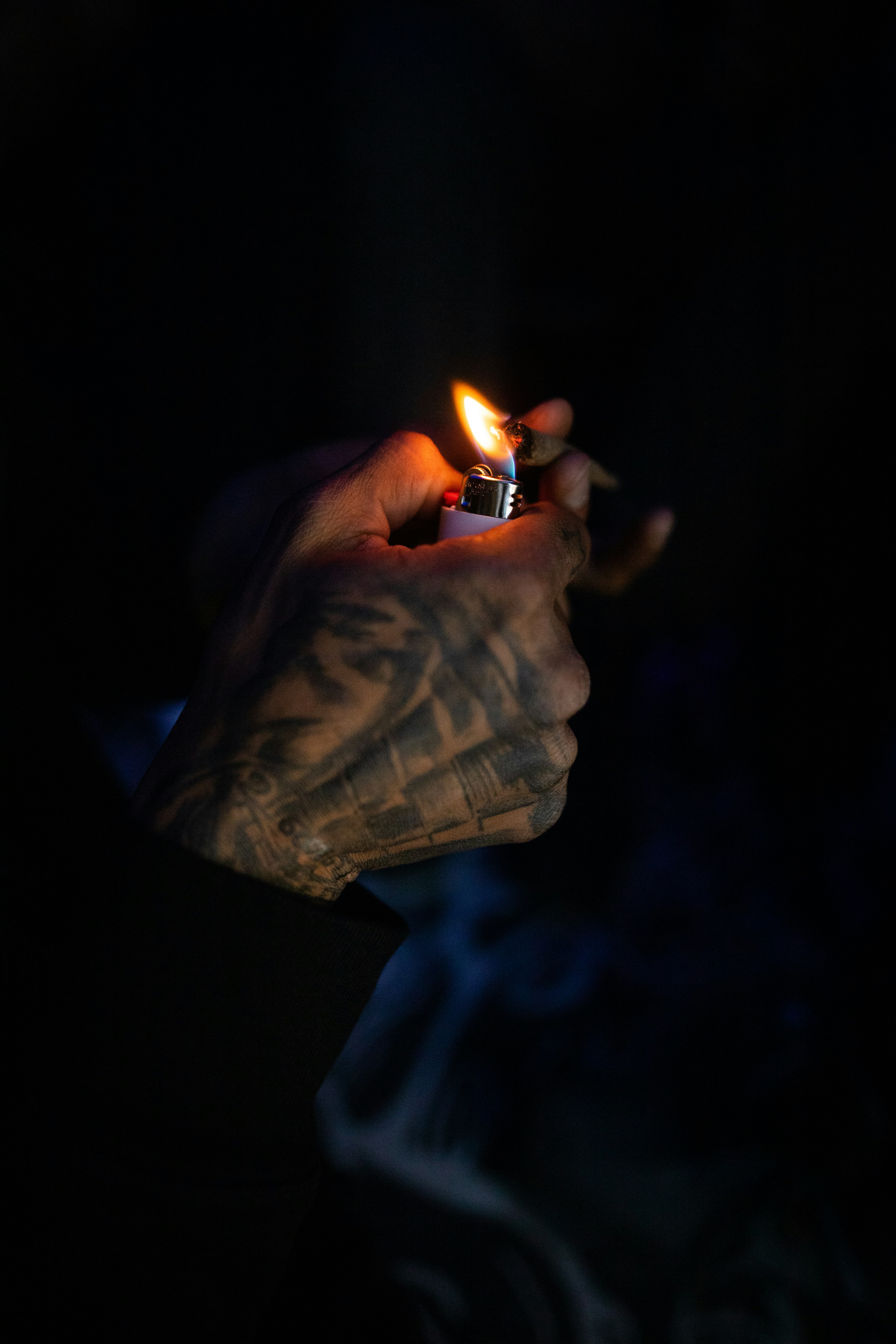 A hand holding a lighter photo – Free Human Image on Unsplash