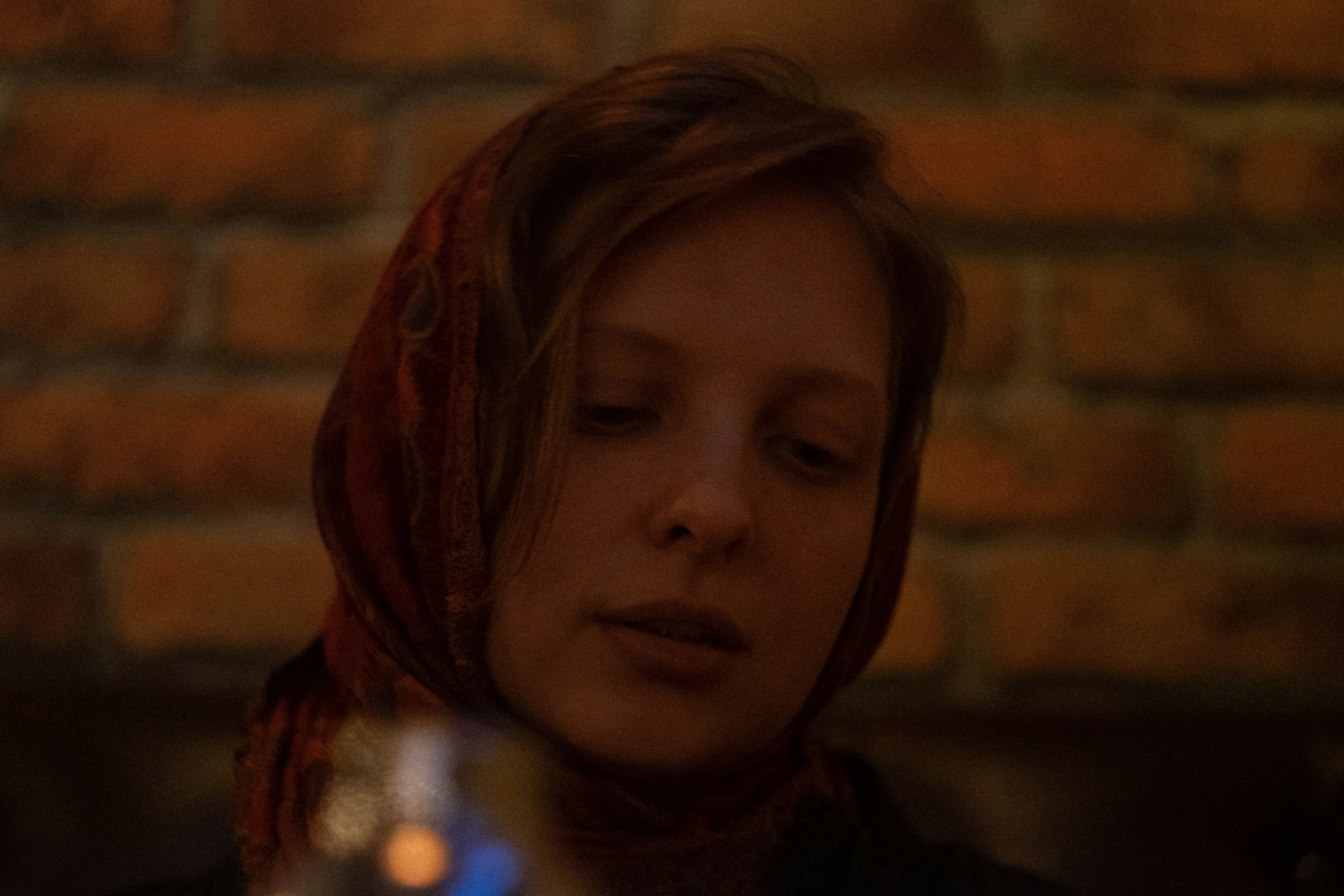 Ember in Bricklight: A Quiet Portrait in Red