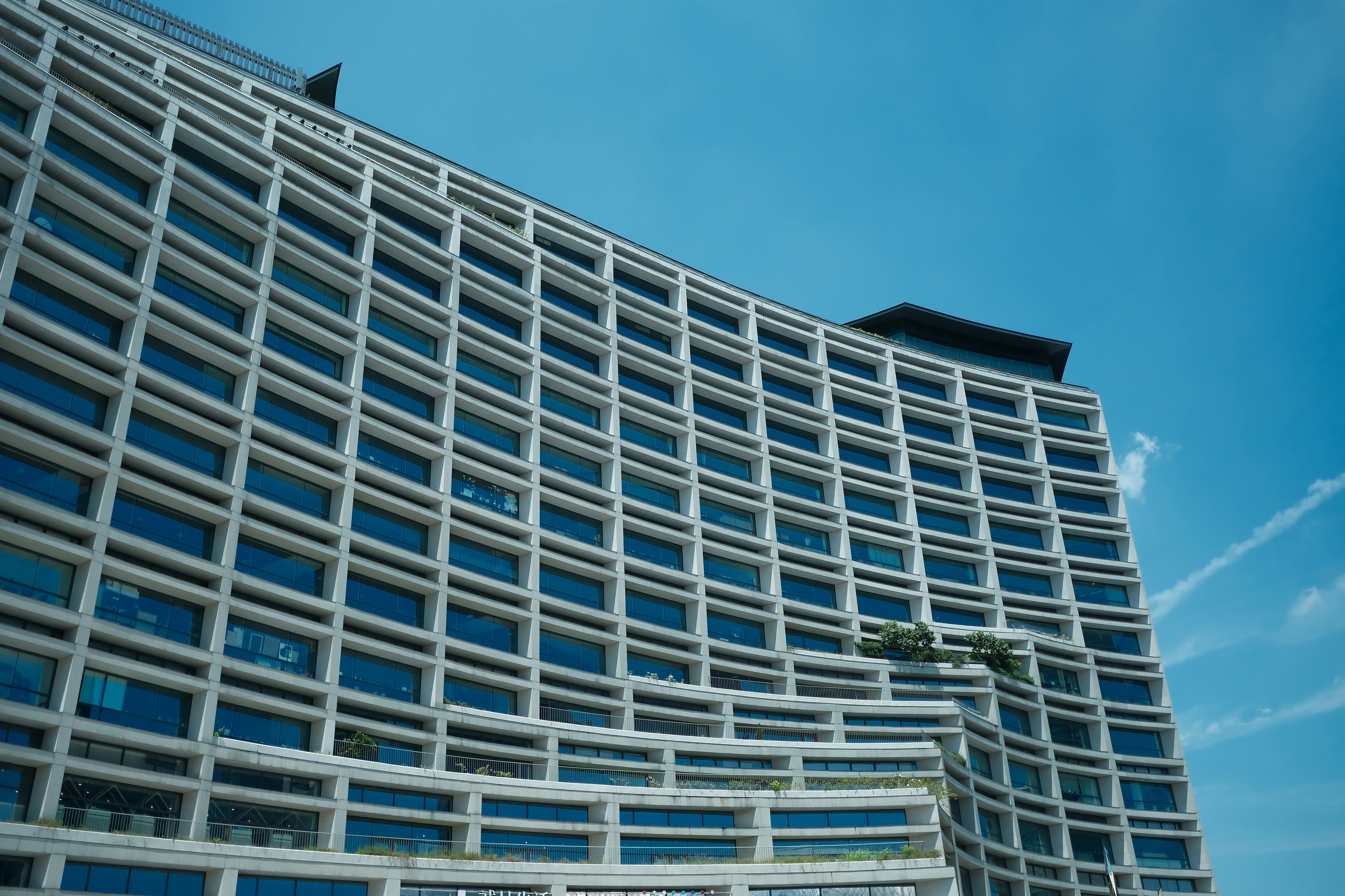 A tall building with many windows photo – Free Taipei city Image on ...