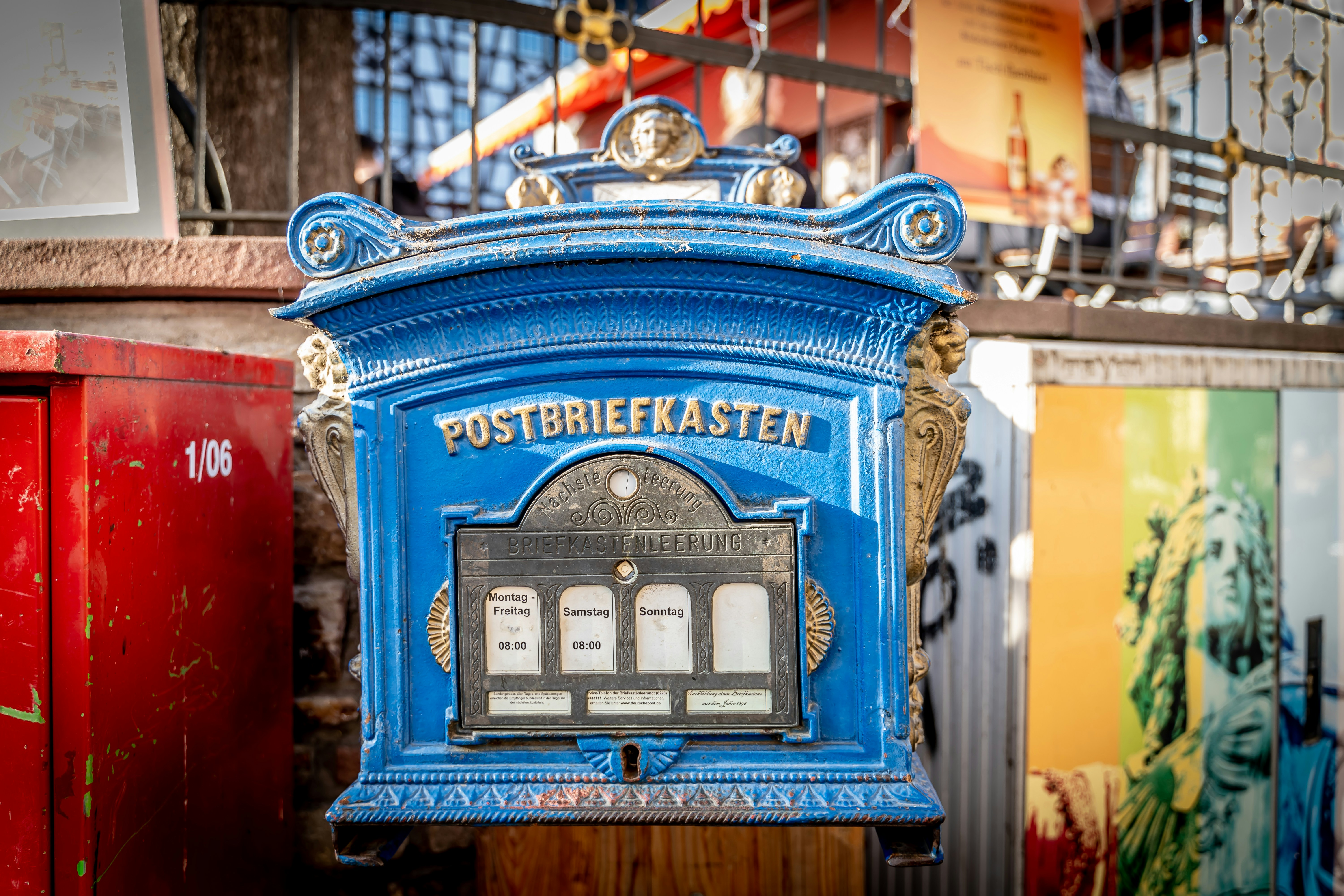 Blue Postbox Vault: A Gem in a Colorful Alleyway