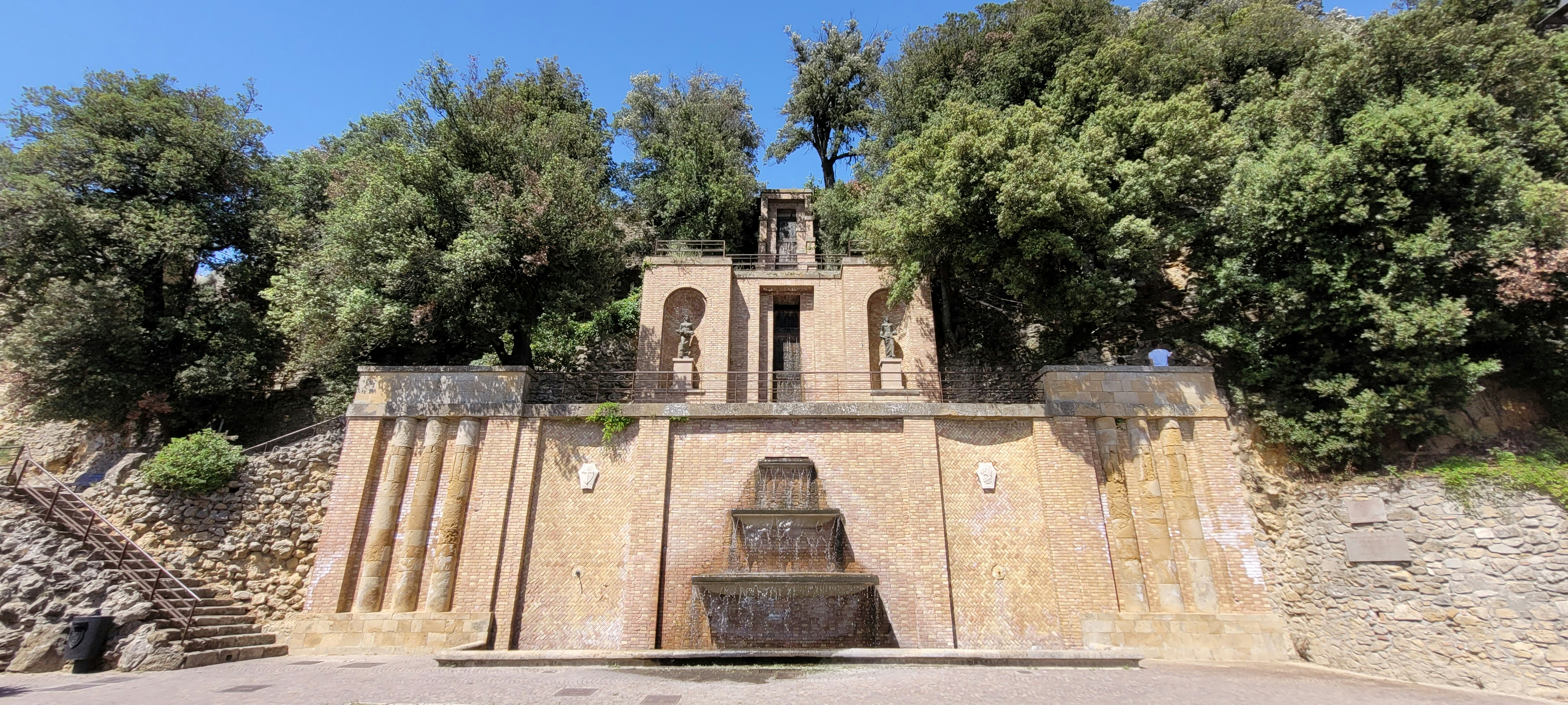 Historic Fountain Embraced by Verdant Canopy