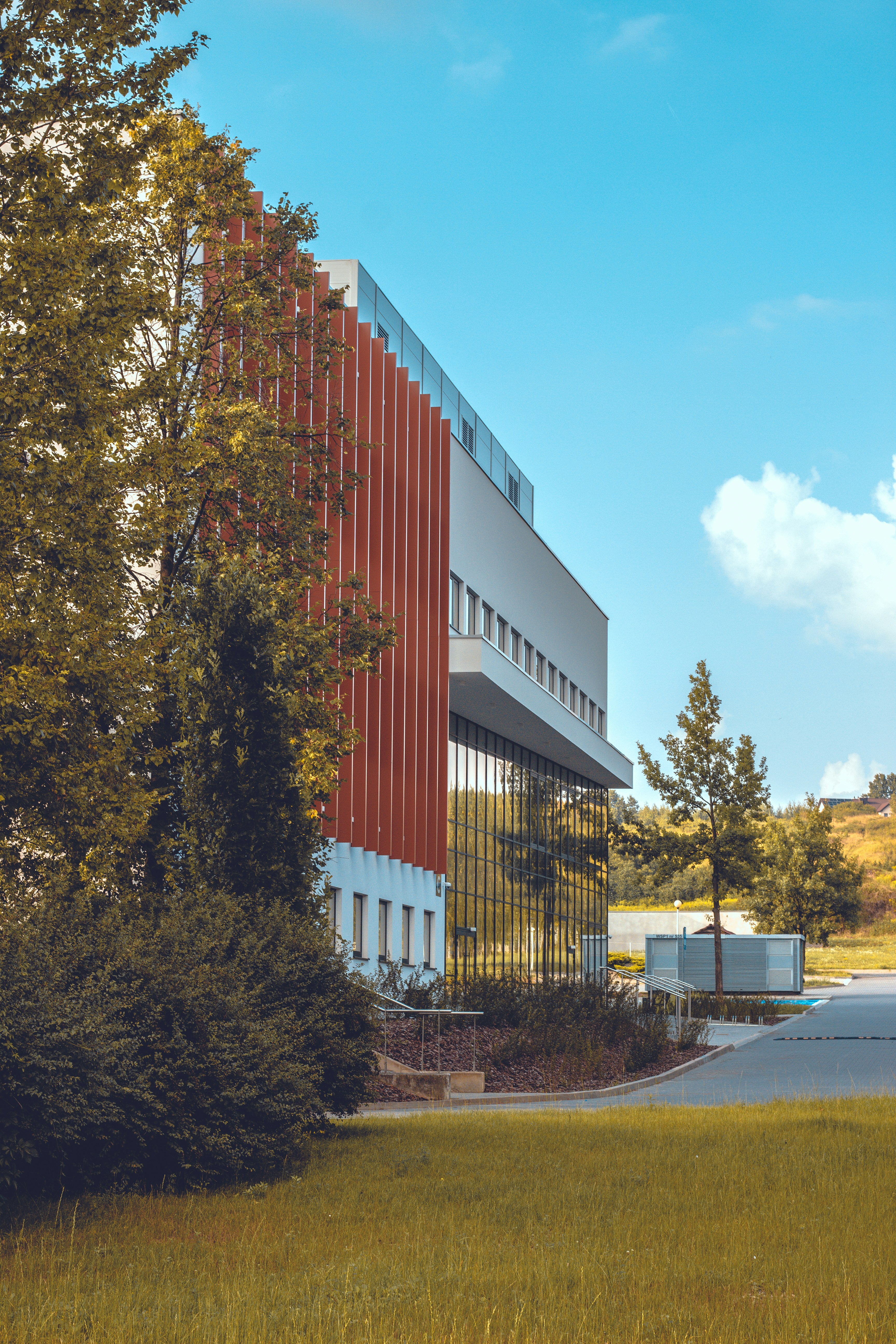 A building with a red and white exterior photo – Free Office building ...