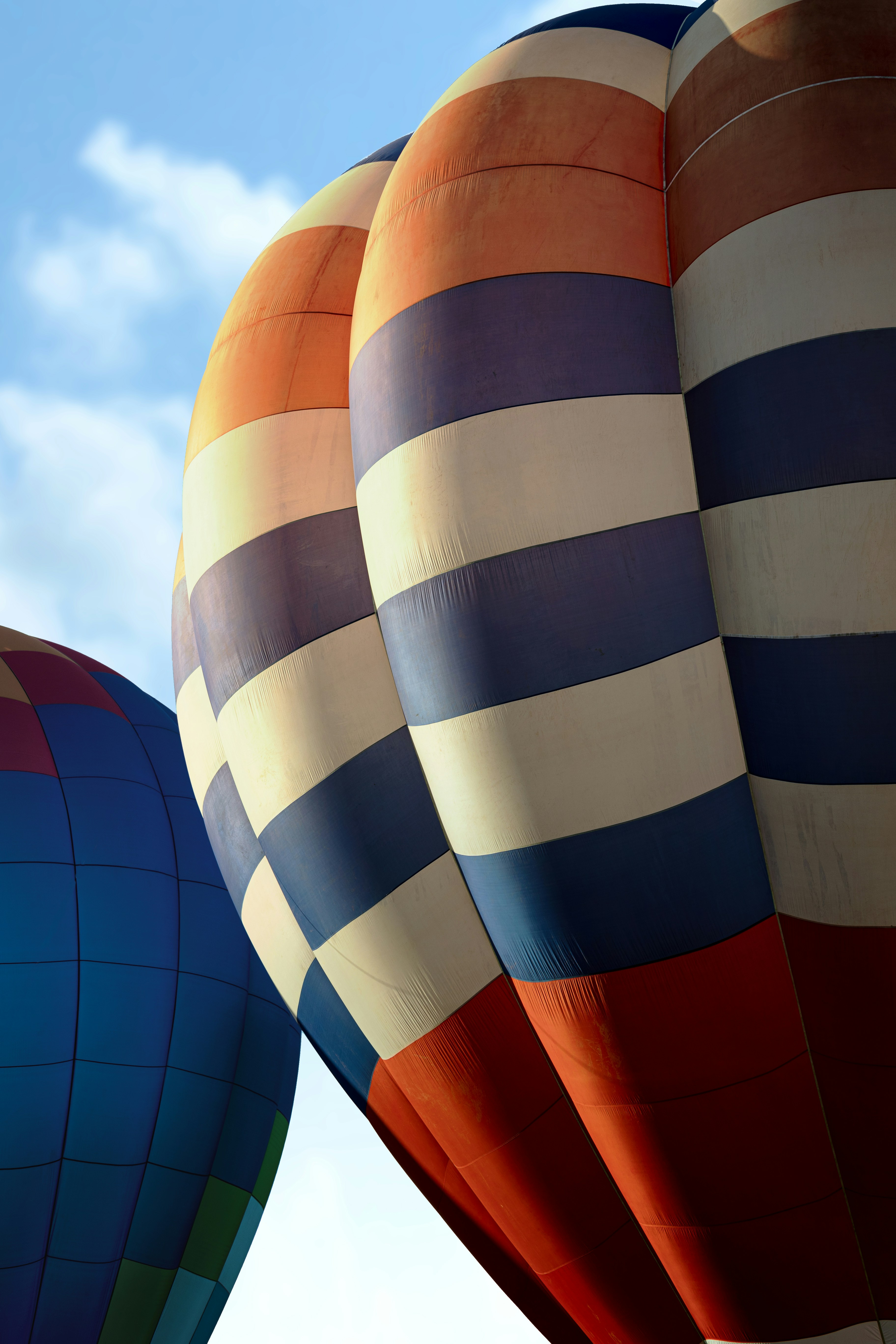 A group of striped buildings photo – Free Hot air balloon Image on Unsplash
