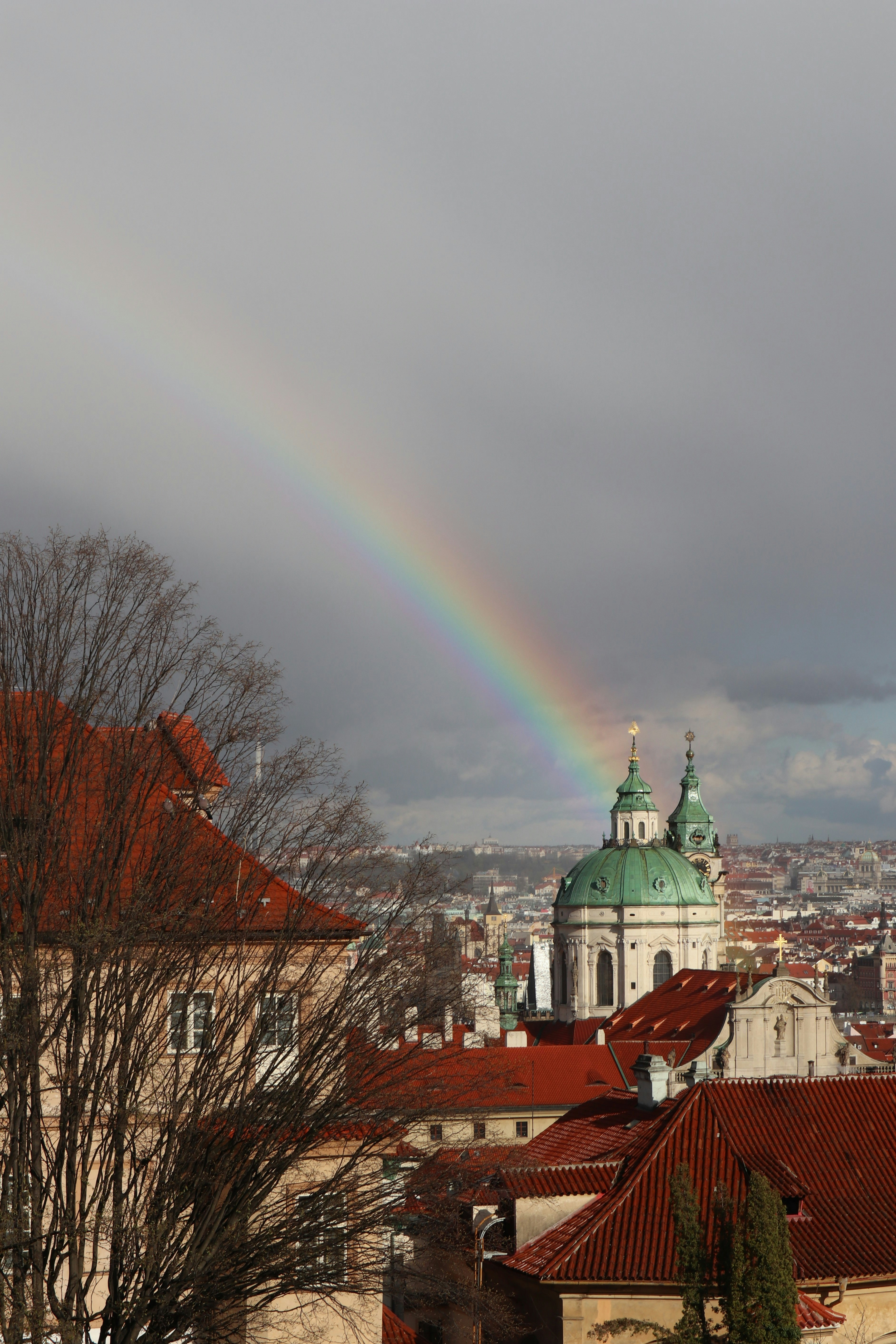 A rainbow over a city photo – Free Prague Image on Unsplash