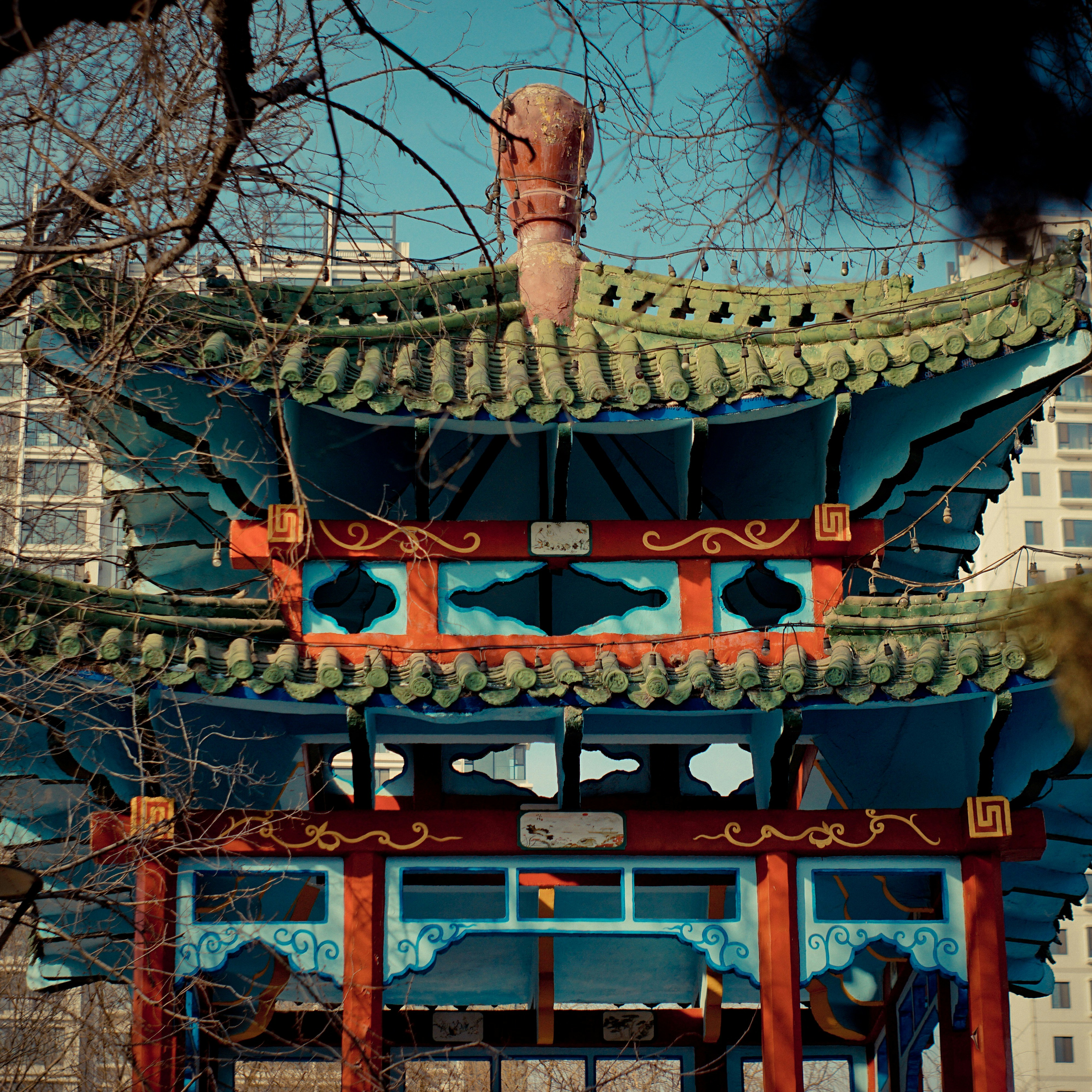 A colorful building with a tree photo – Free China Image on Unsplash
