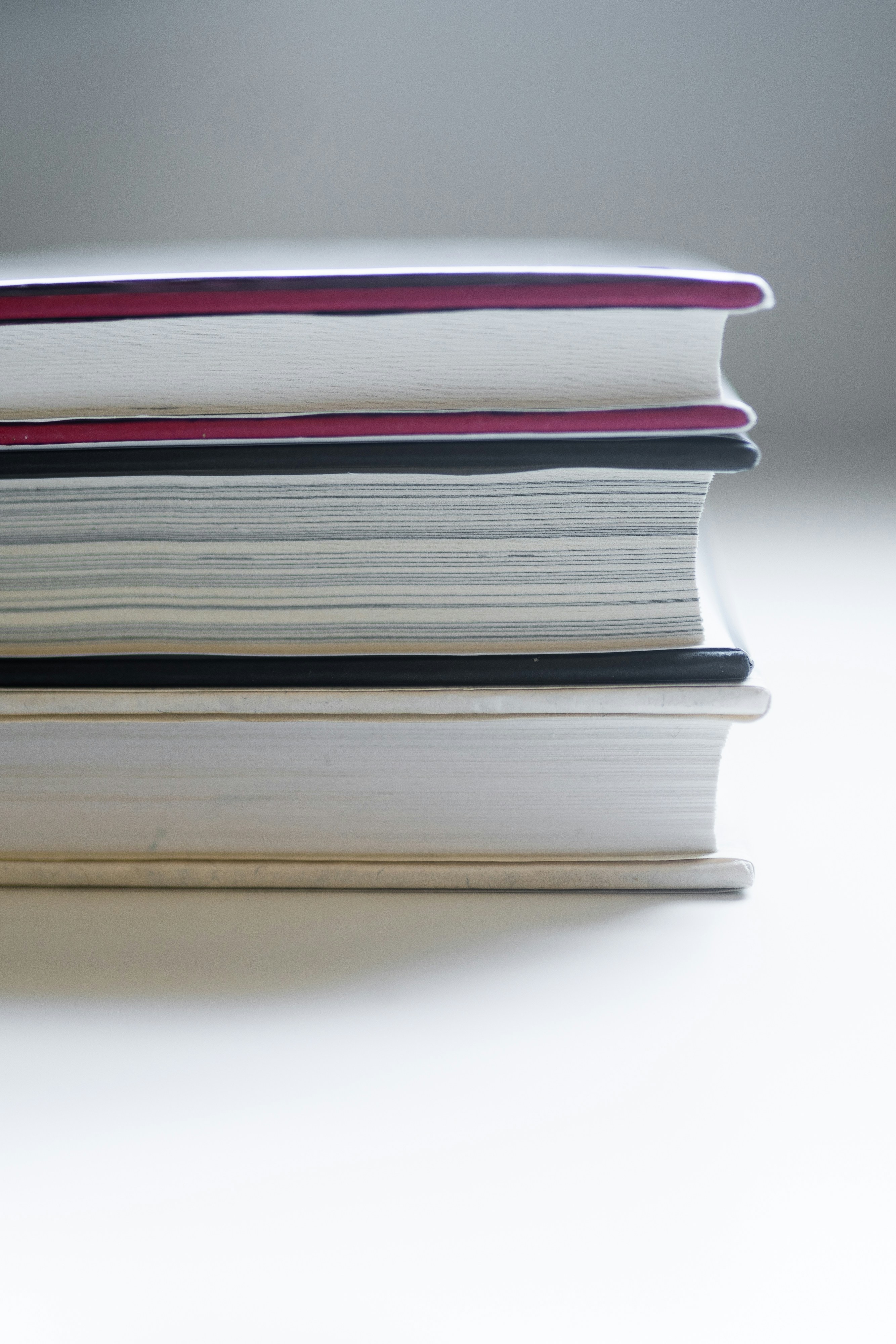 A stack of books photo – Free Grey Image on Unsplash