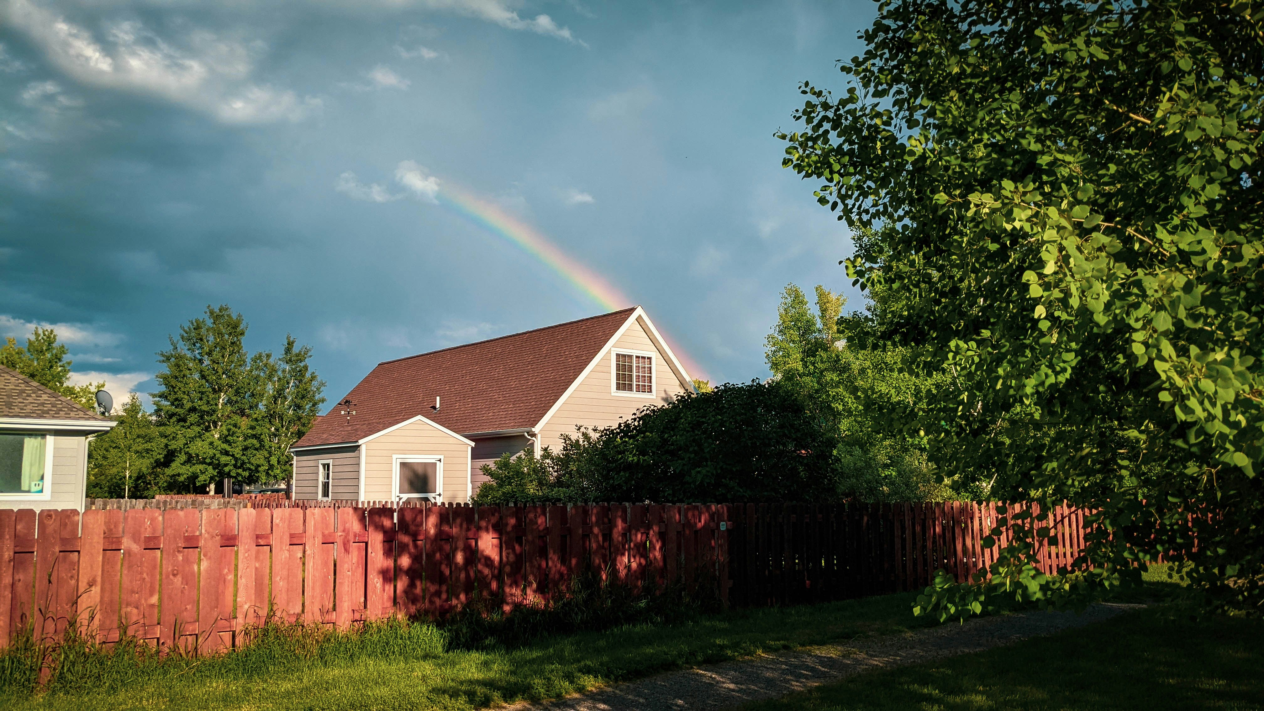 A rainbow over a house photo – Free Usa Image on Unsplash