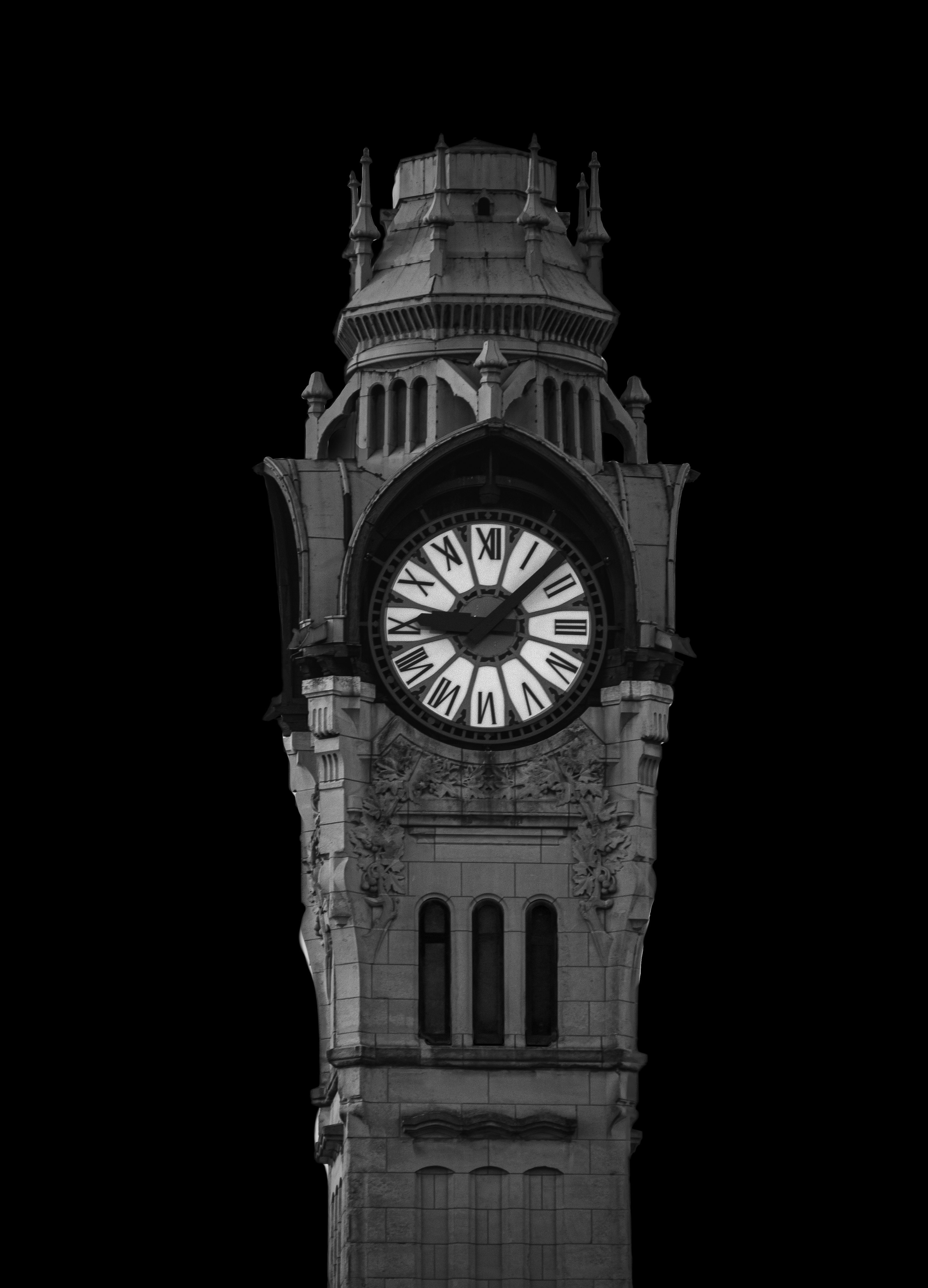 Nocturnal Timekeeper: A Clock Tower Rising from Velvet Black