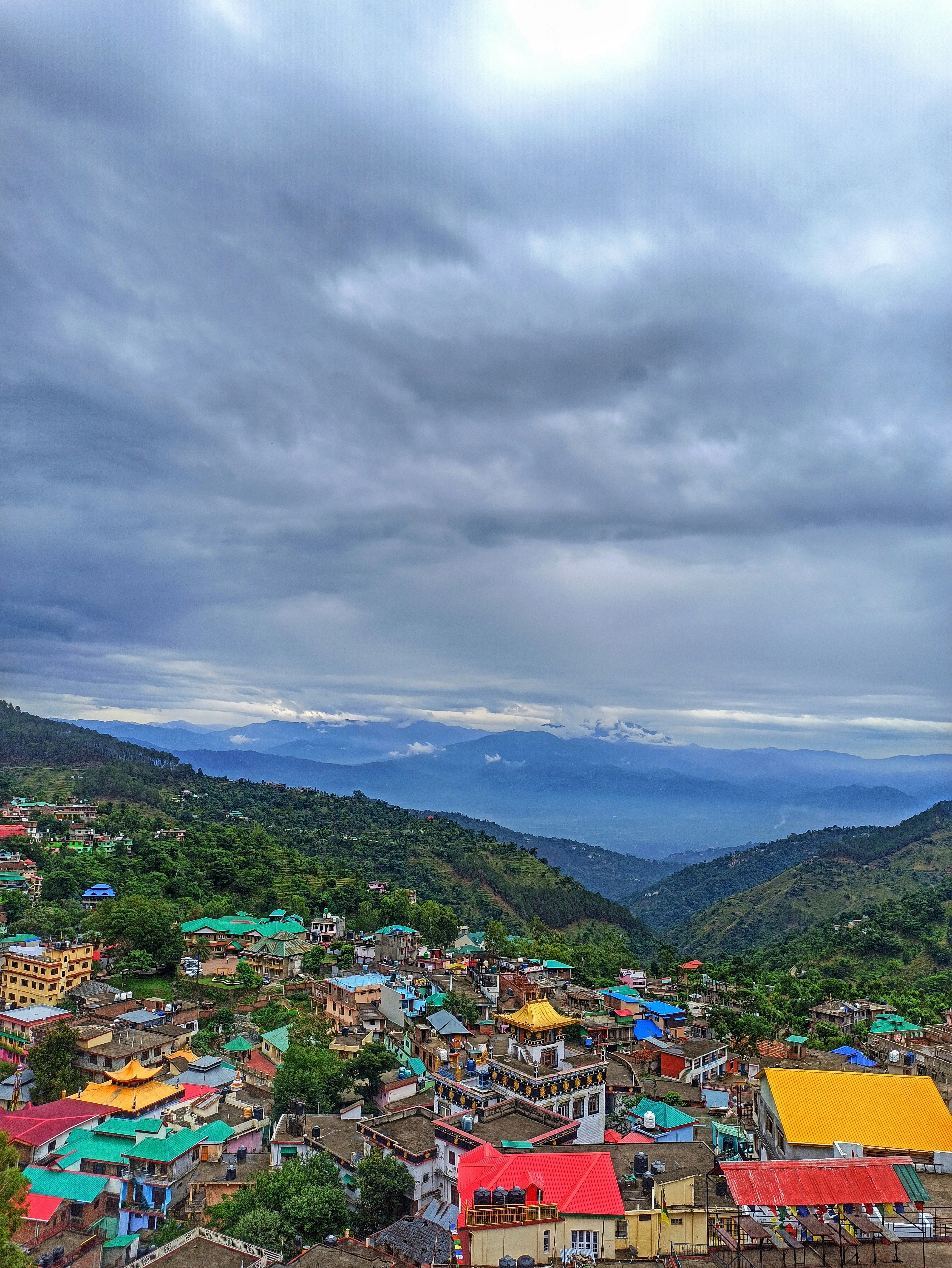 A town with many colorful buildings photo – Free Rewalsar lake Image on ...
