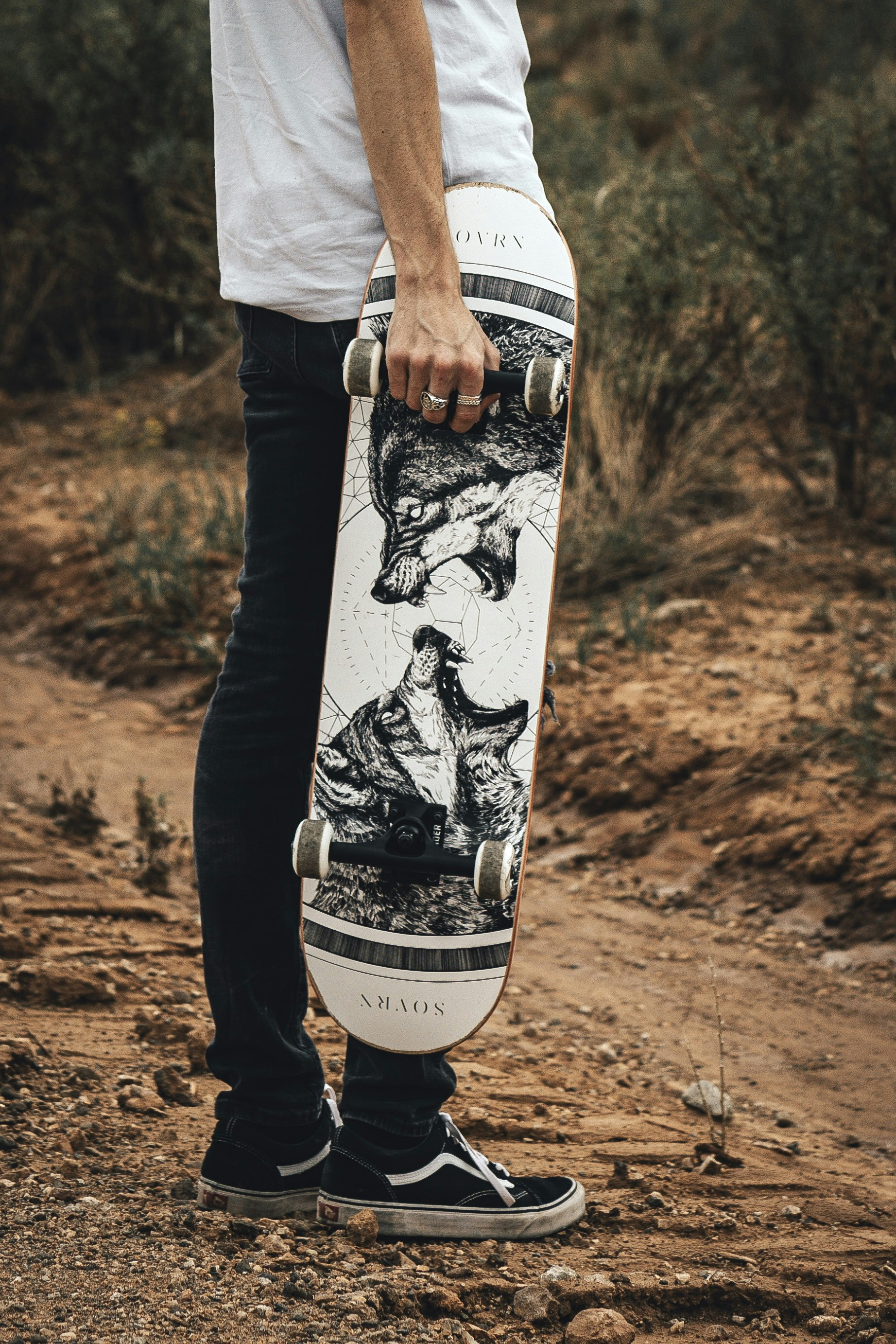 Boardwalk Quiet: A Skater Stance with a Portrait of Motion