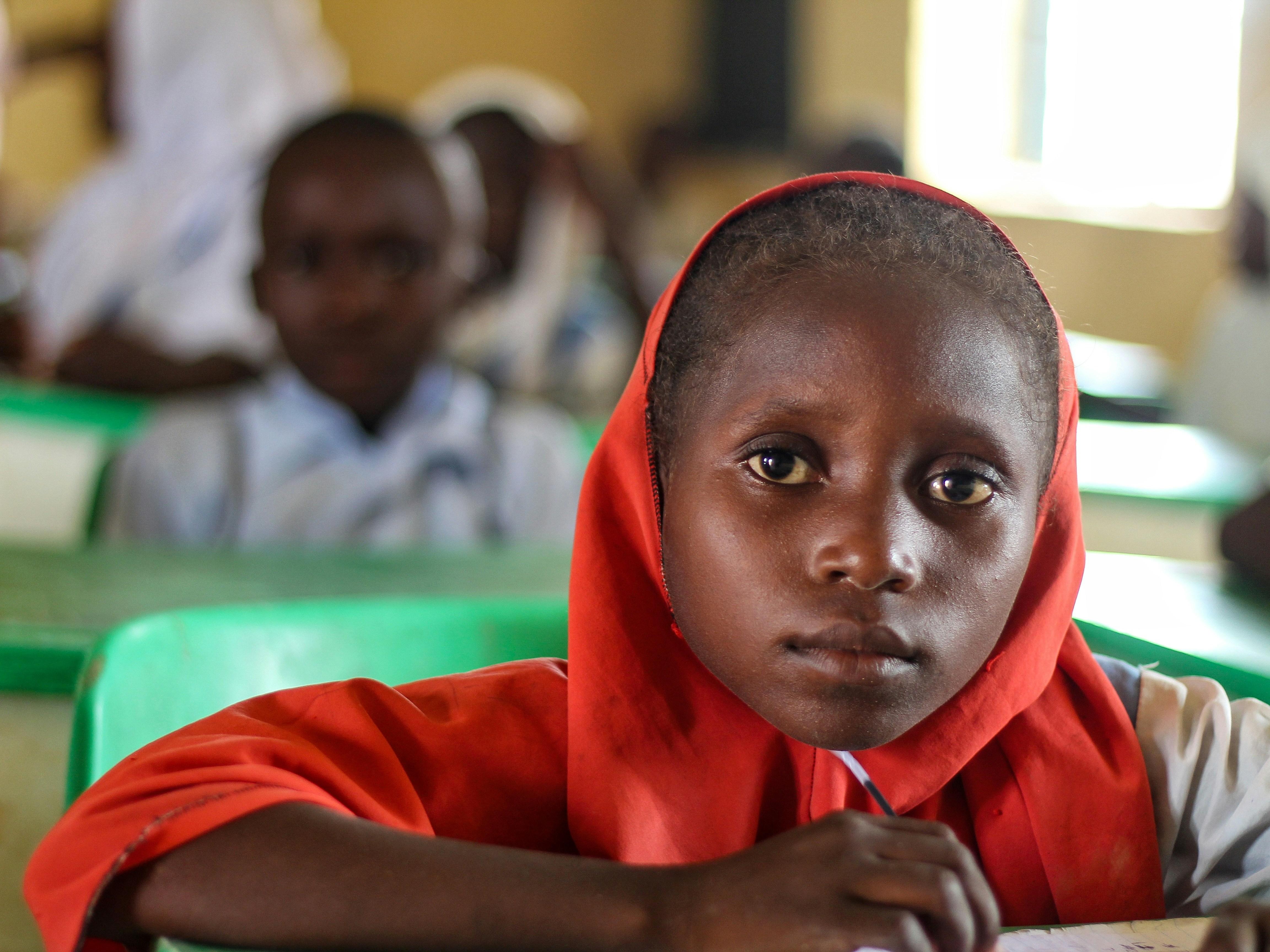 A young boy with a red hood photo – Free Person Image on Unsplash