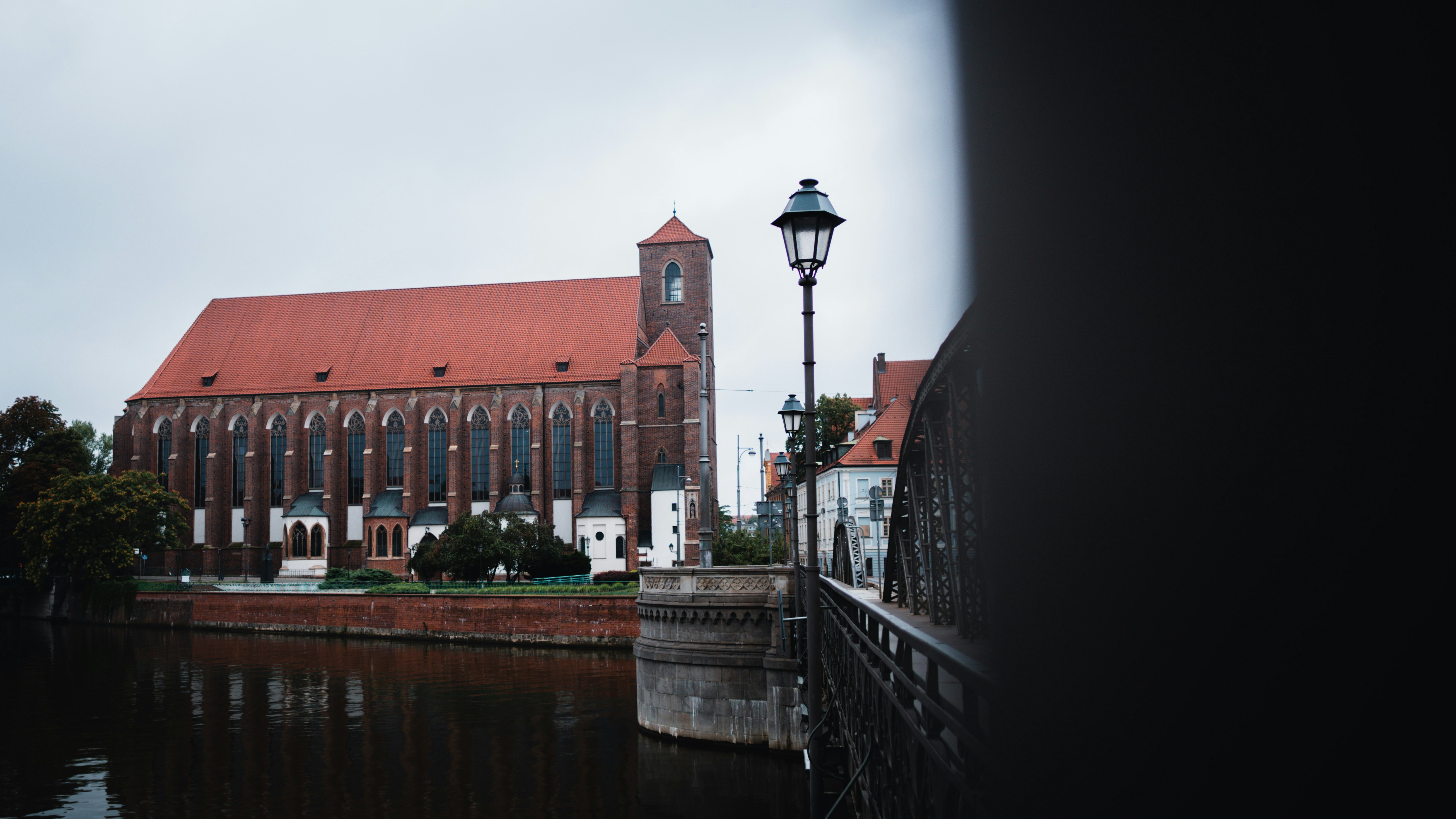 Brick Cathedral by the River: A Quiet City Corner
