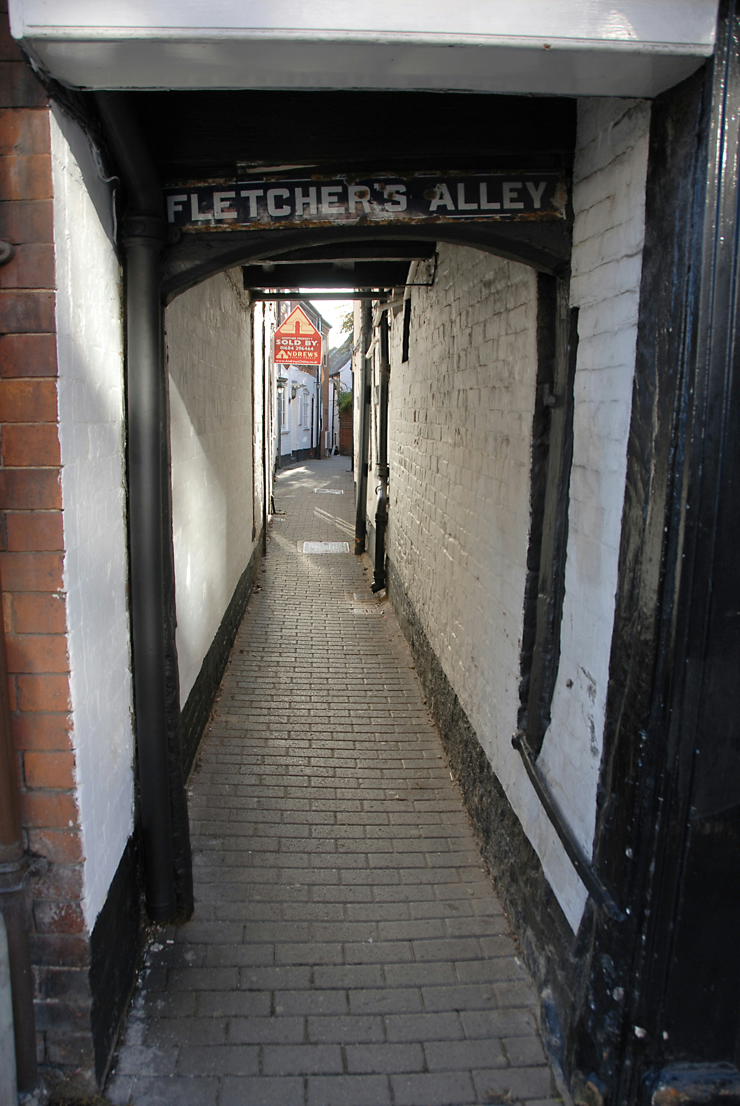 Fletcher's Alley: Light at the End of a Brick-Walled Corridor