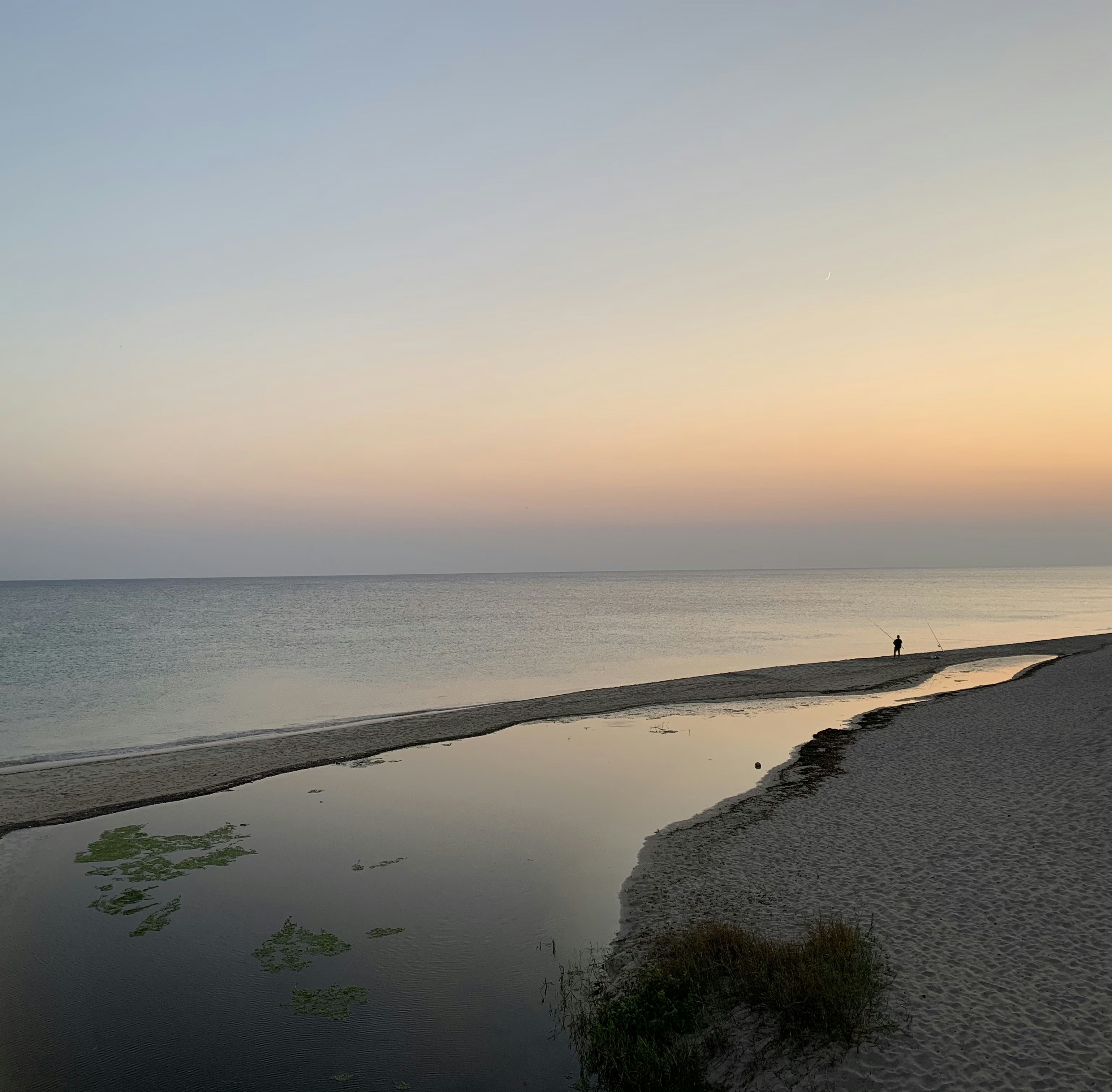 Serenity at Dusk: A Coastal Reflection