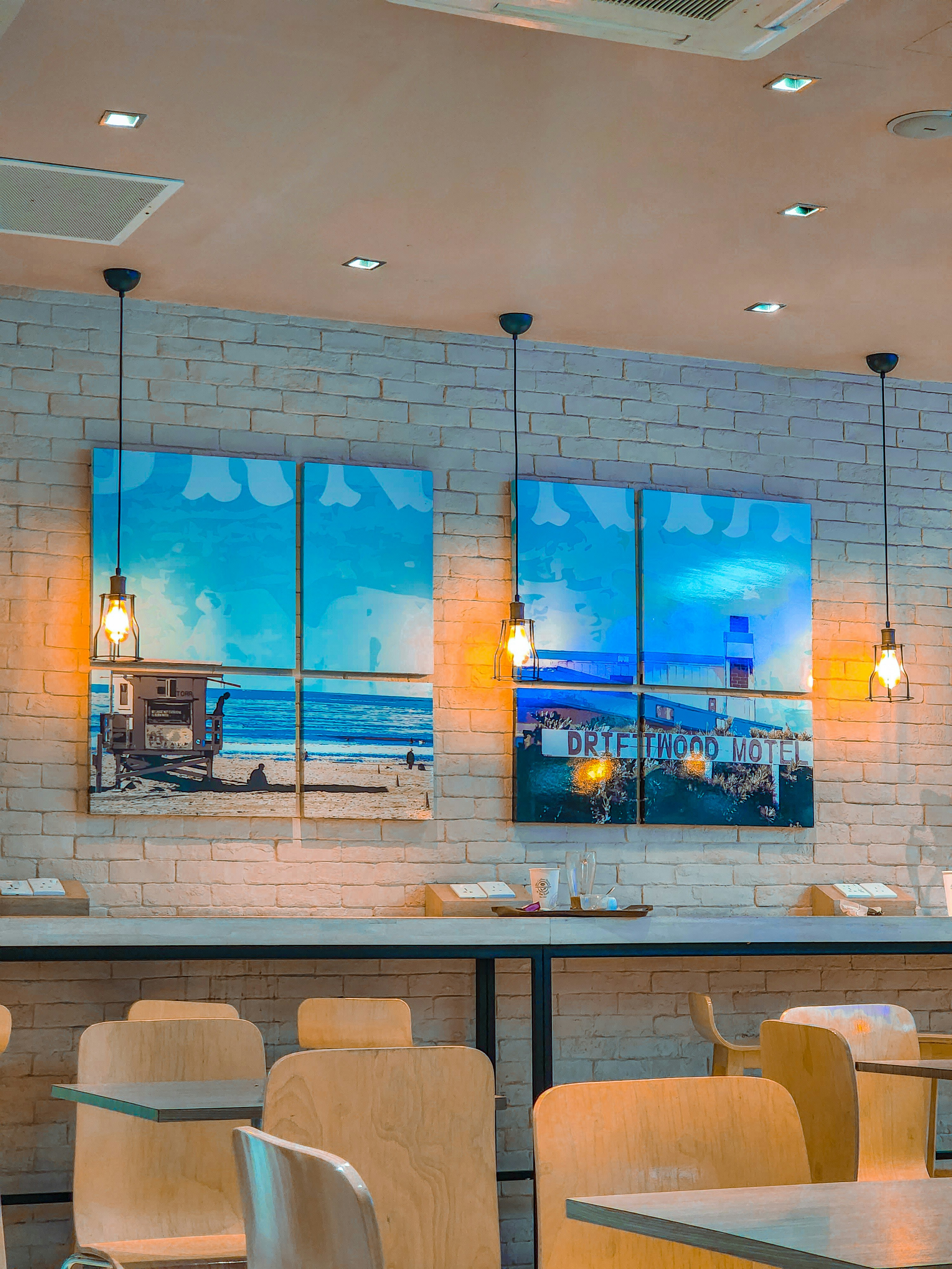 a restaurant with tables and chairs