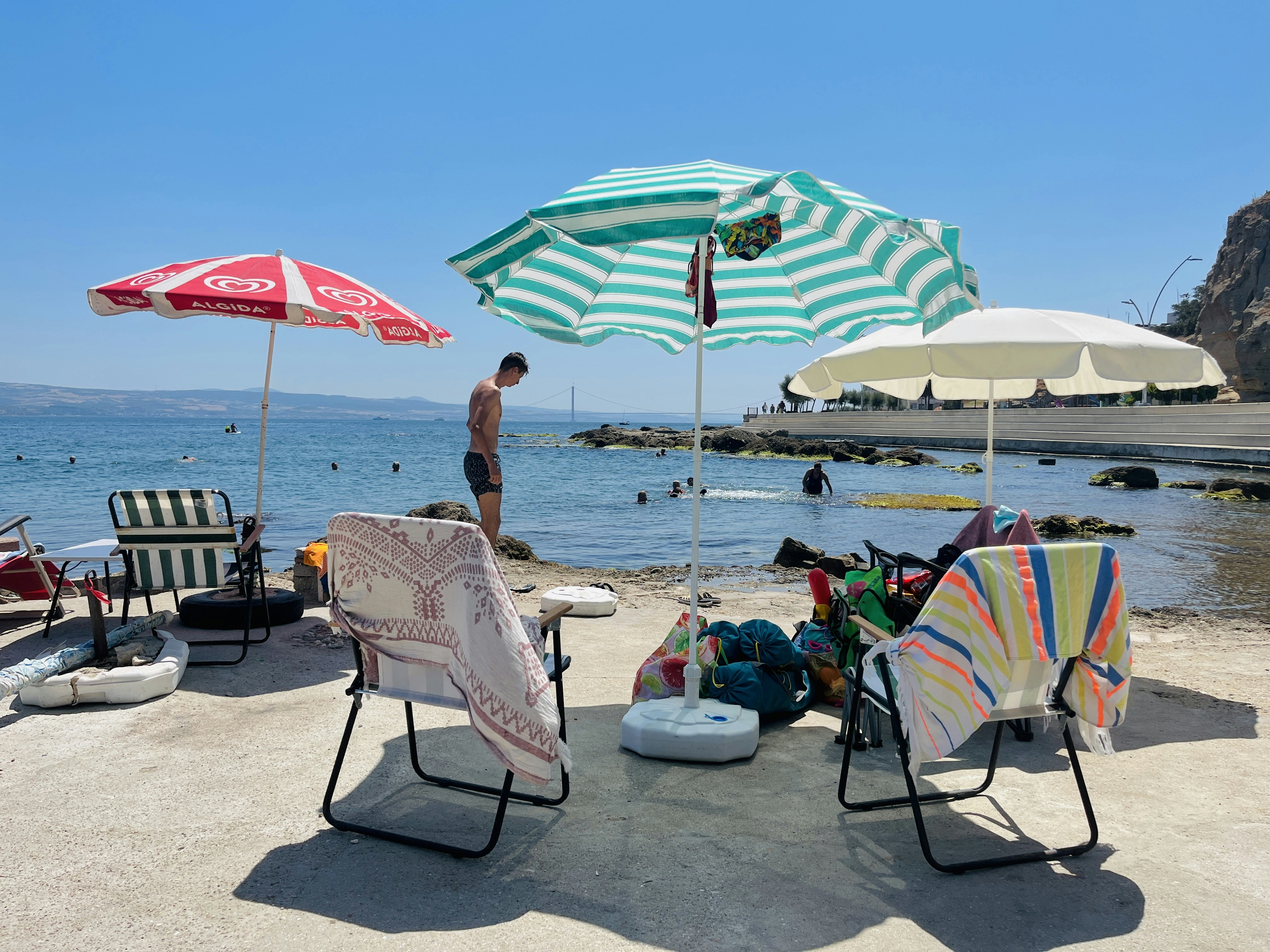 Seaside Serenity Under Striped Umbrellas