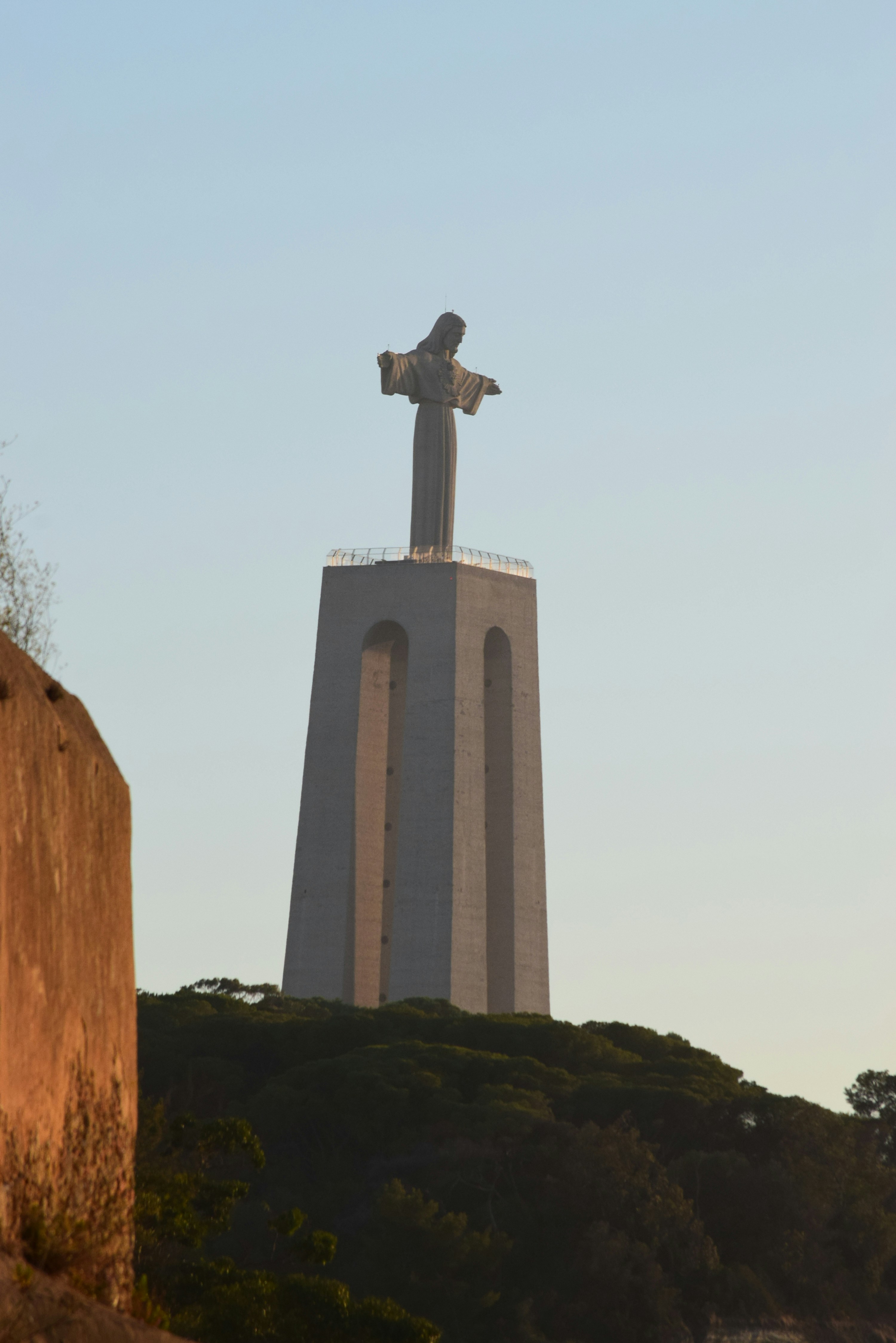 Raised Hands on a Skyward Spire: Christ Statue Overlook