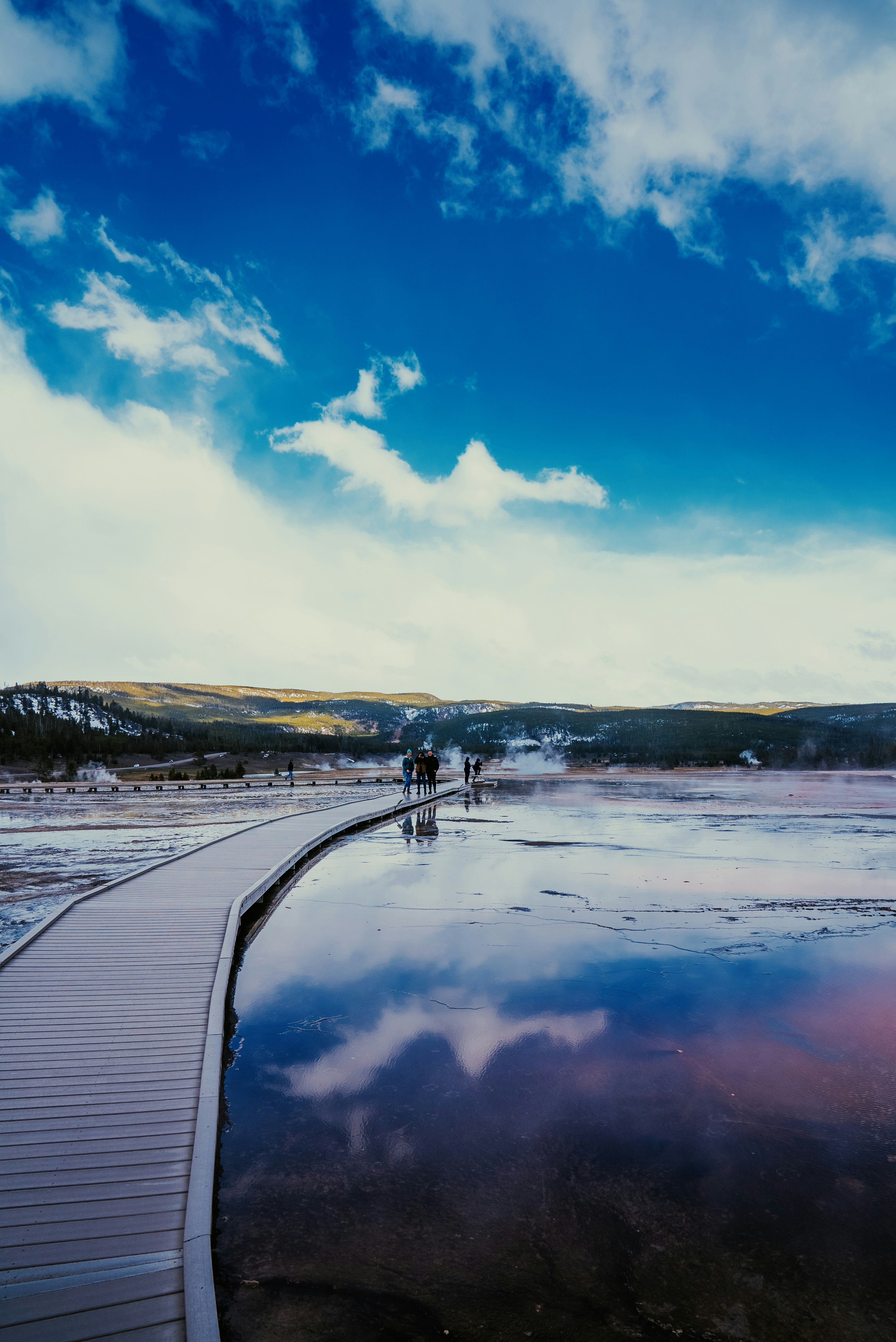 Curved Boardwalk over a Cerulean Salt Flat