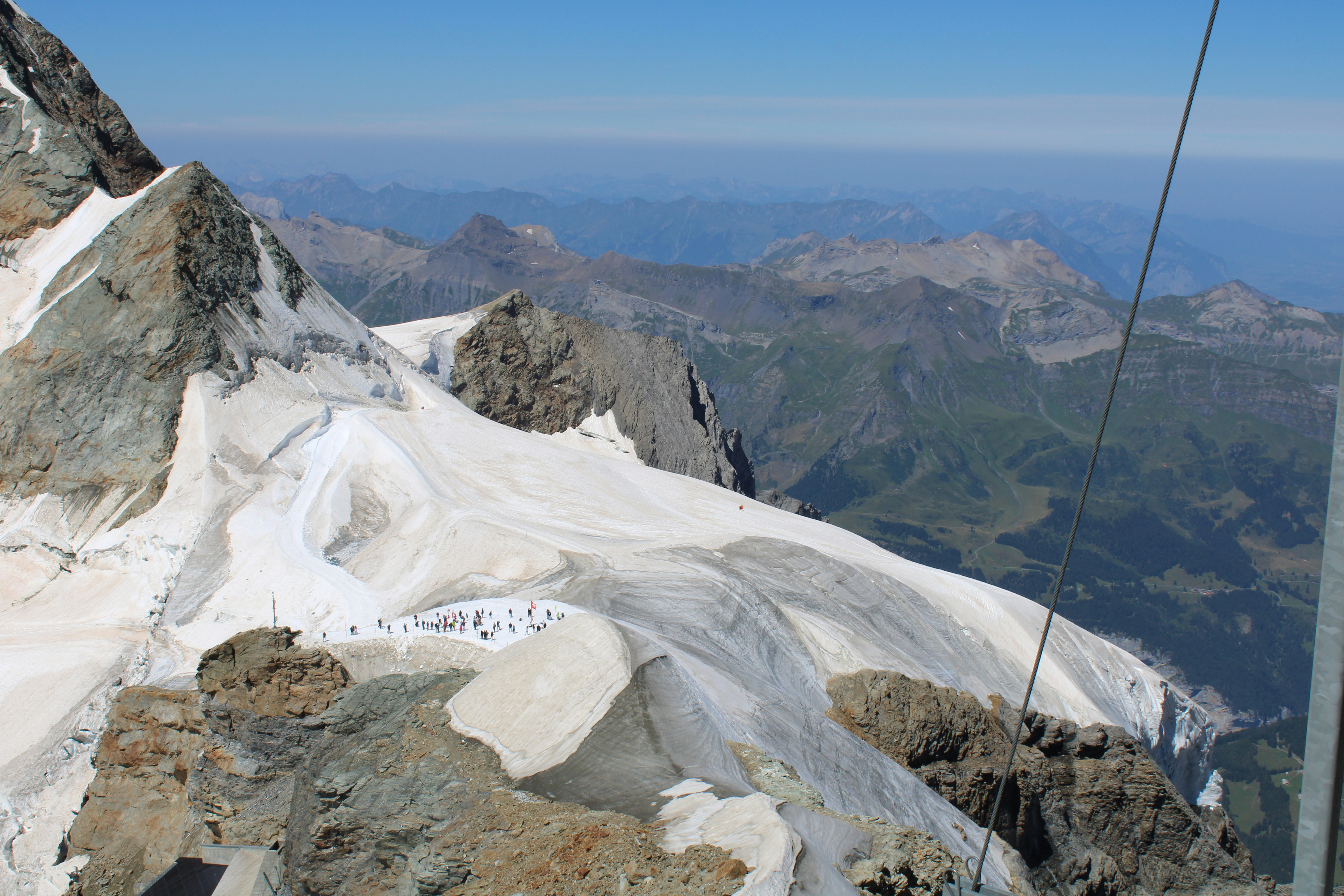 Ridge of Snow and Stone Beneath a Clear Alpine Sky