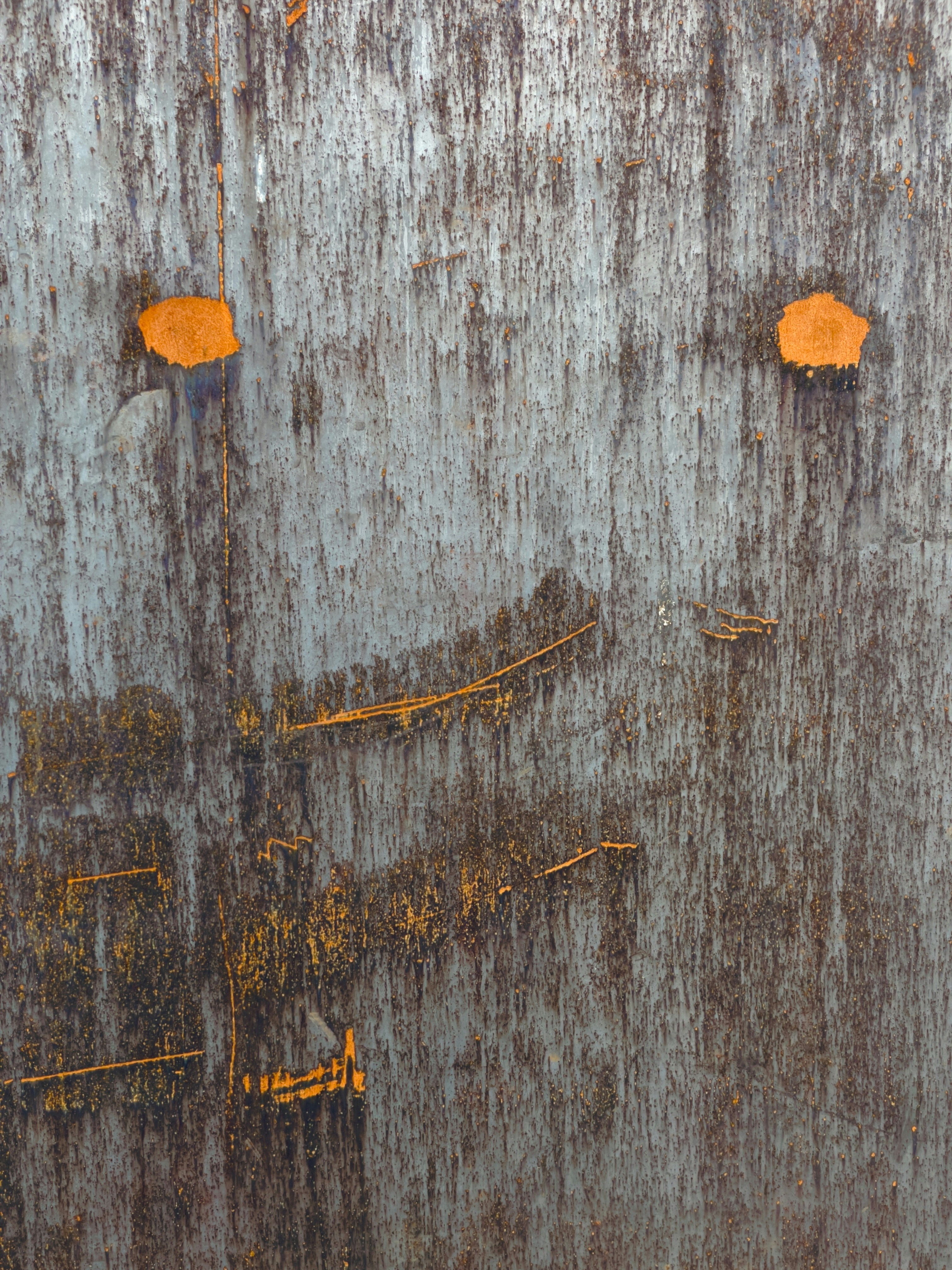 Copper Arc on Weathered Wood: A Close-Up of a Timeworn Plank
