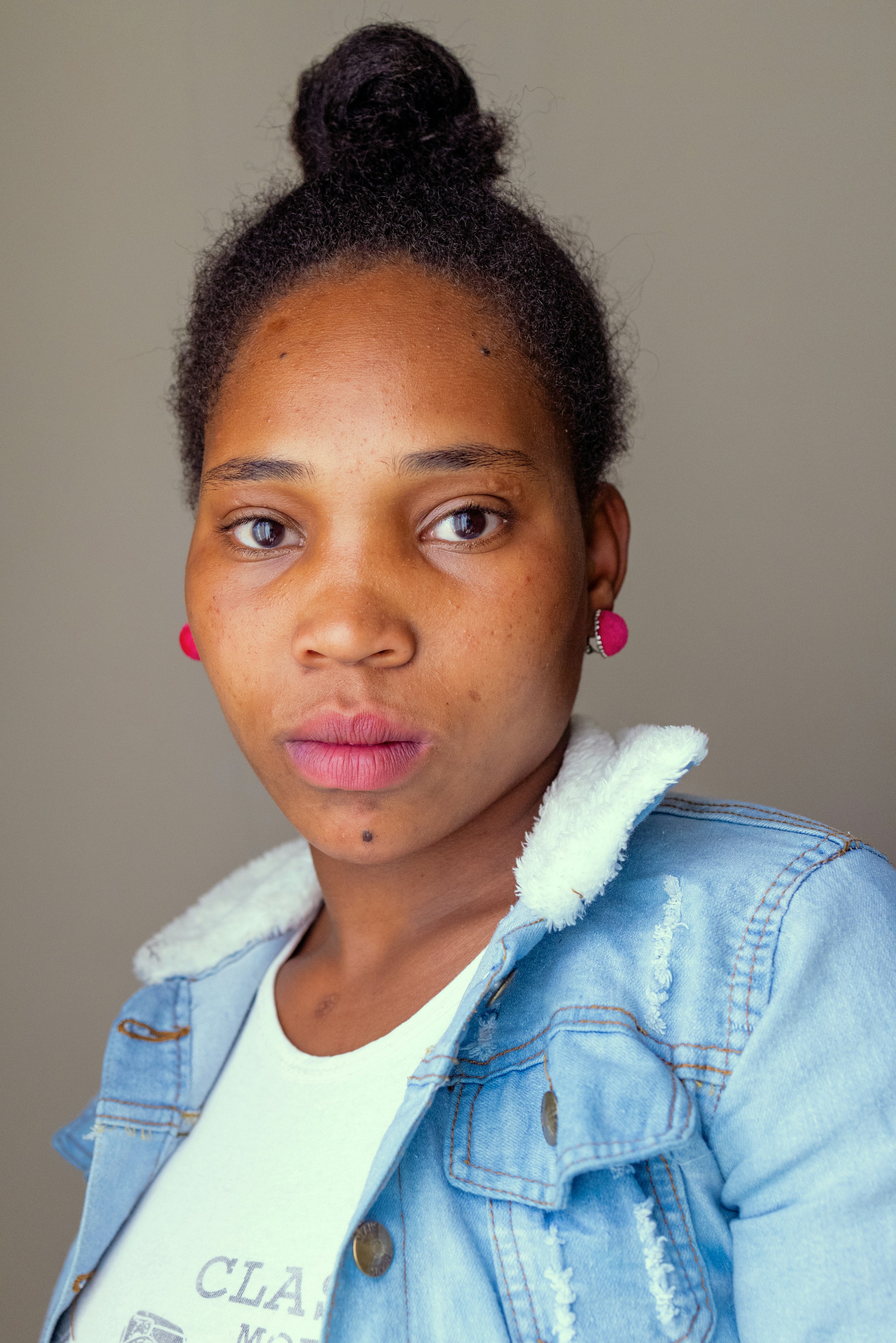 A person posing for the camera photo – Free Face Image on Unsplash