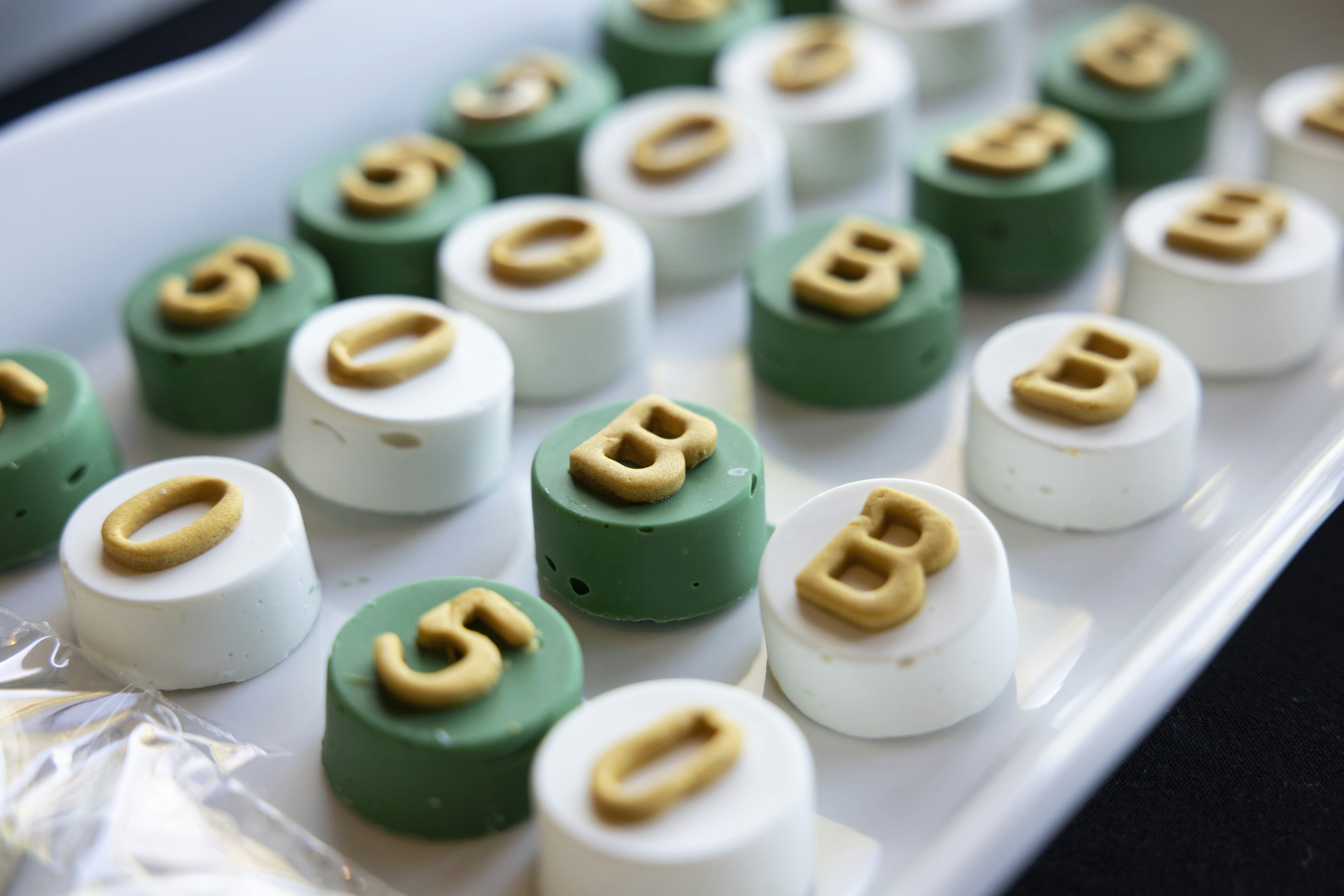 Gilded Alphabet Orbs: Mint and Ivory Fondant Cookies on a Tray