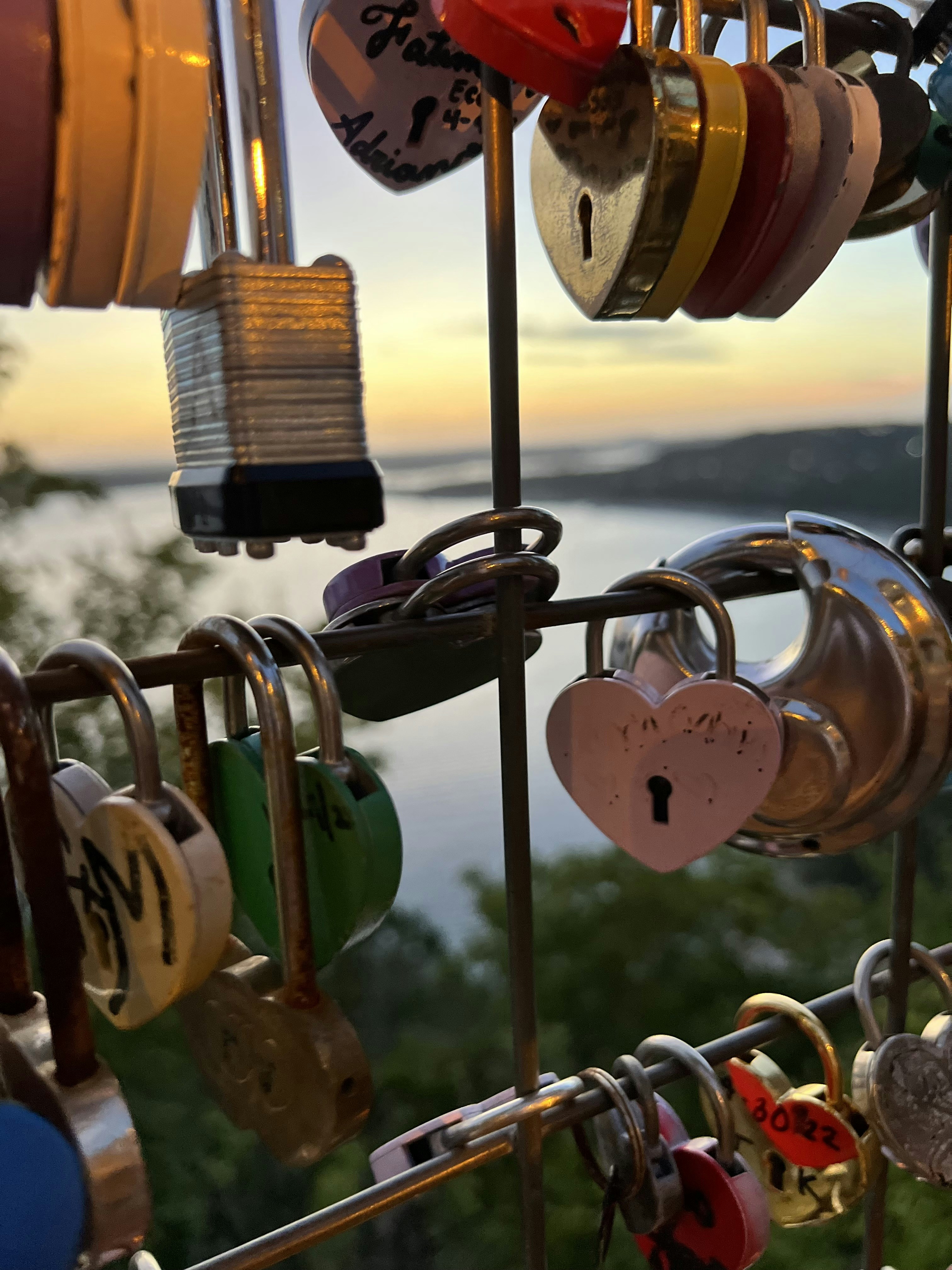 Locks of Light: Sunset Over a Sea of Padlocks