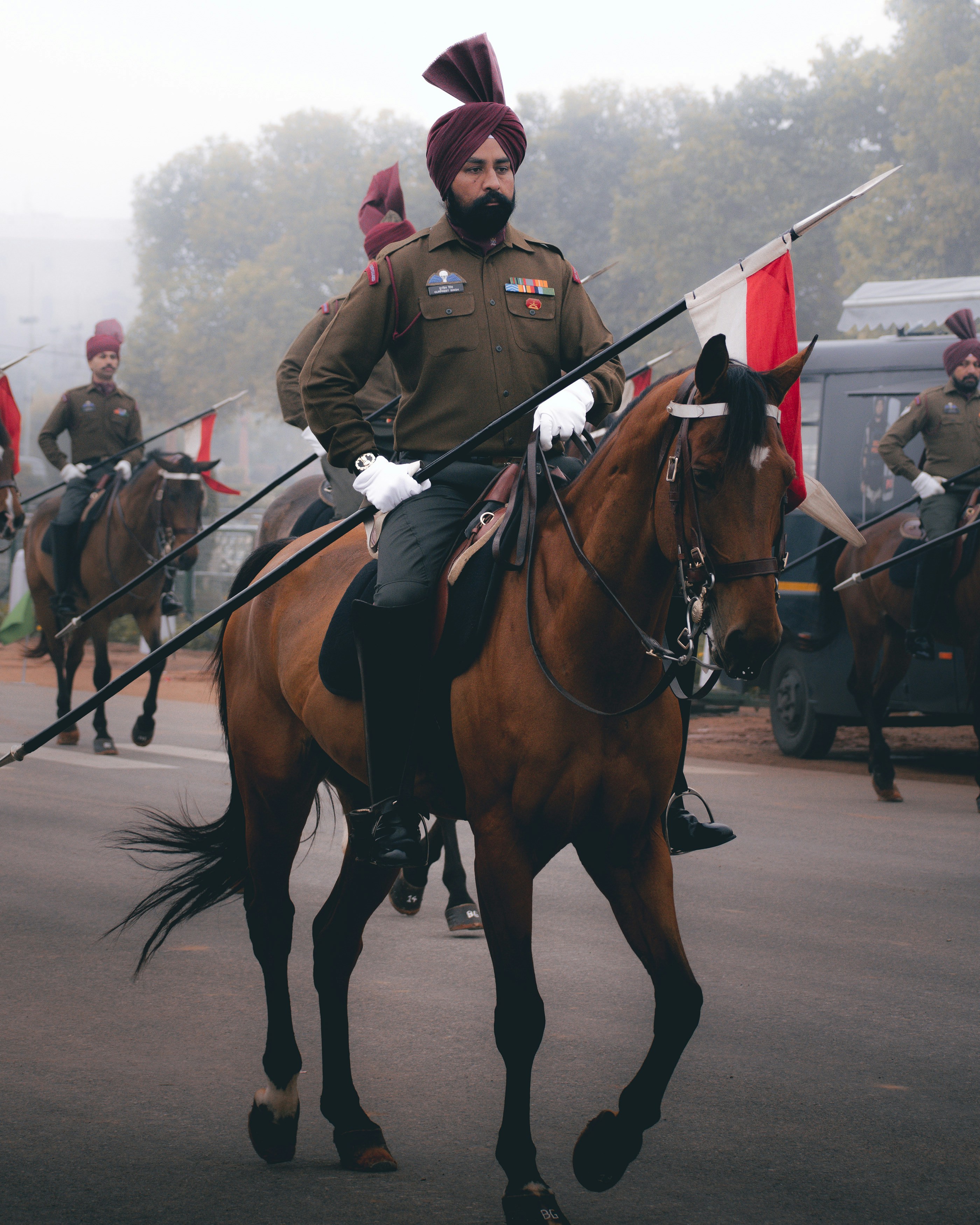 A man in a uniform riding a horse photo – Free Current events Image on ...