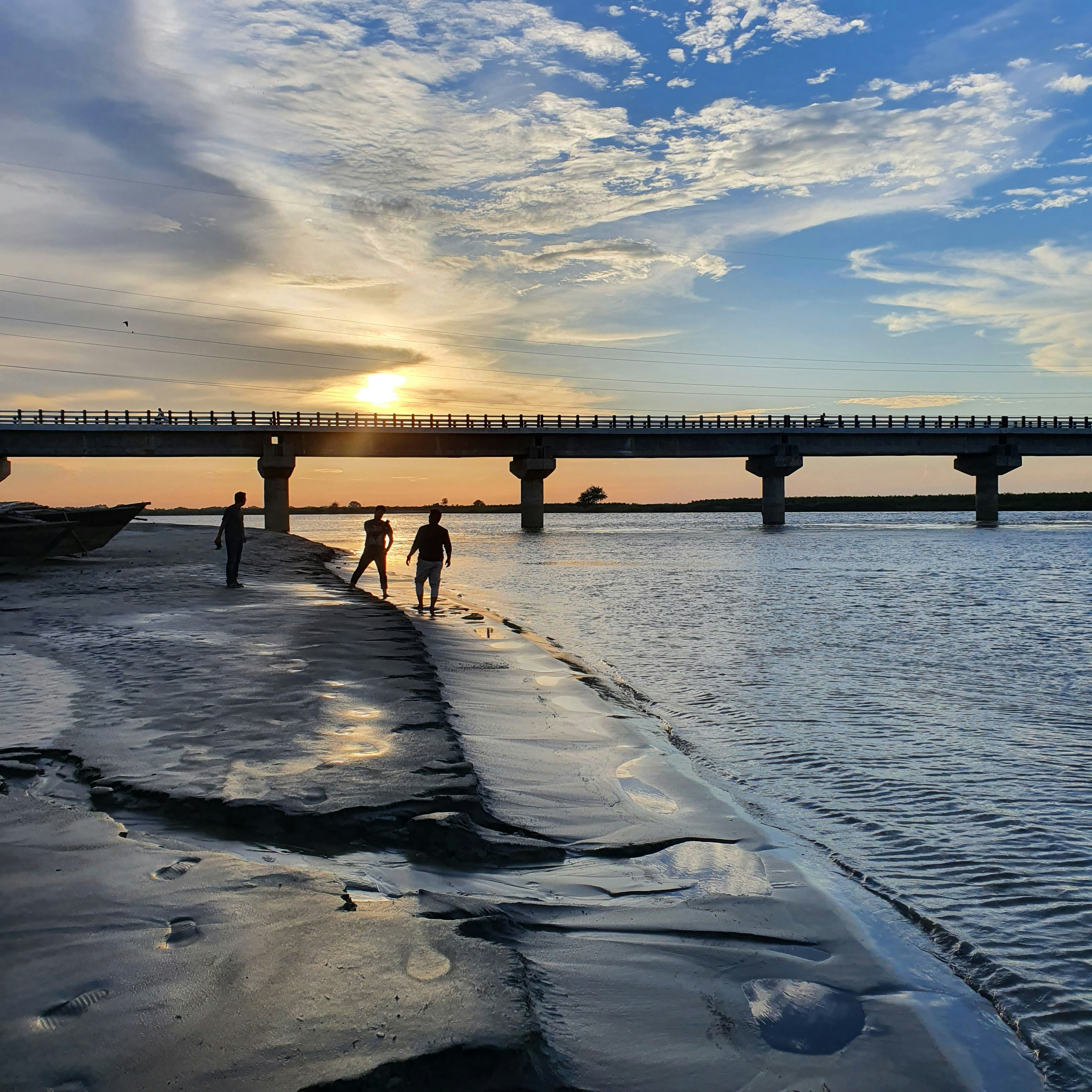 people walking on a beach
