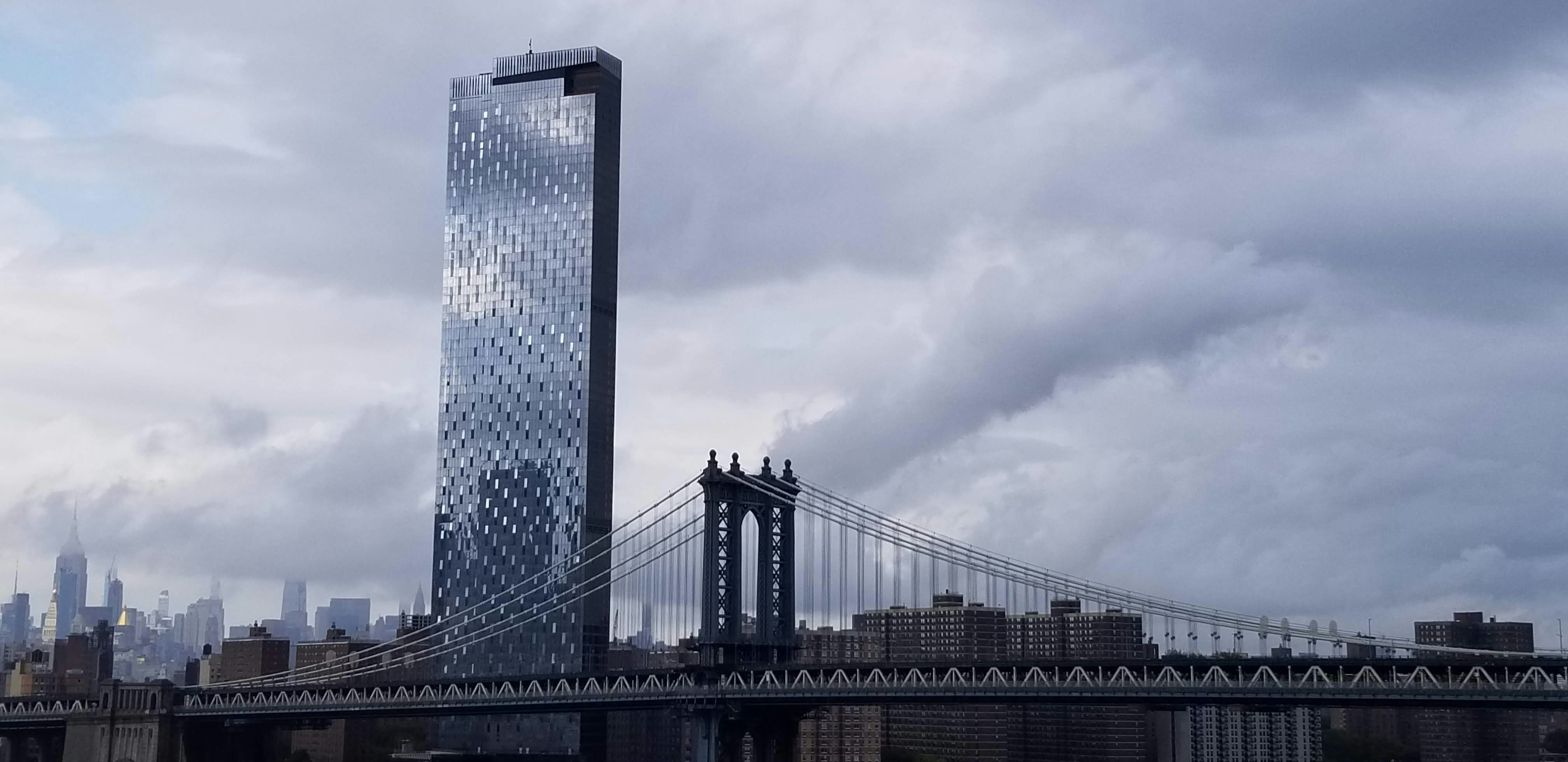 Cables, Towers, and Skyline: Brooklyn Bridge Meets a Modern Glass Ledger