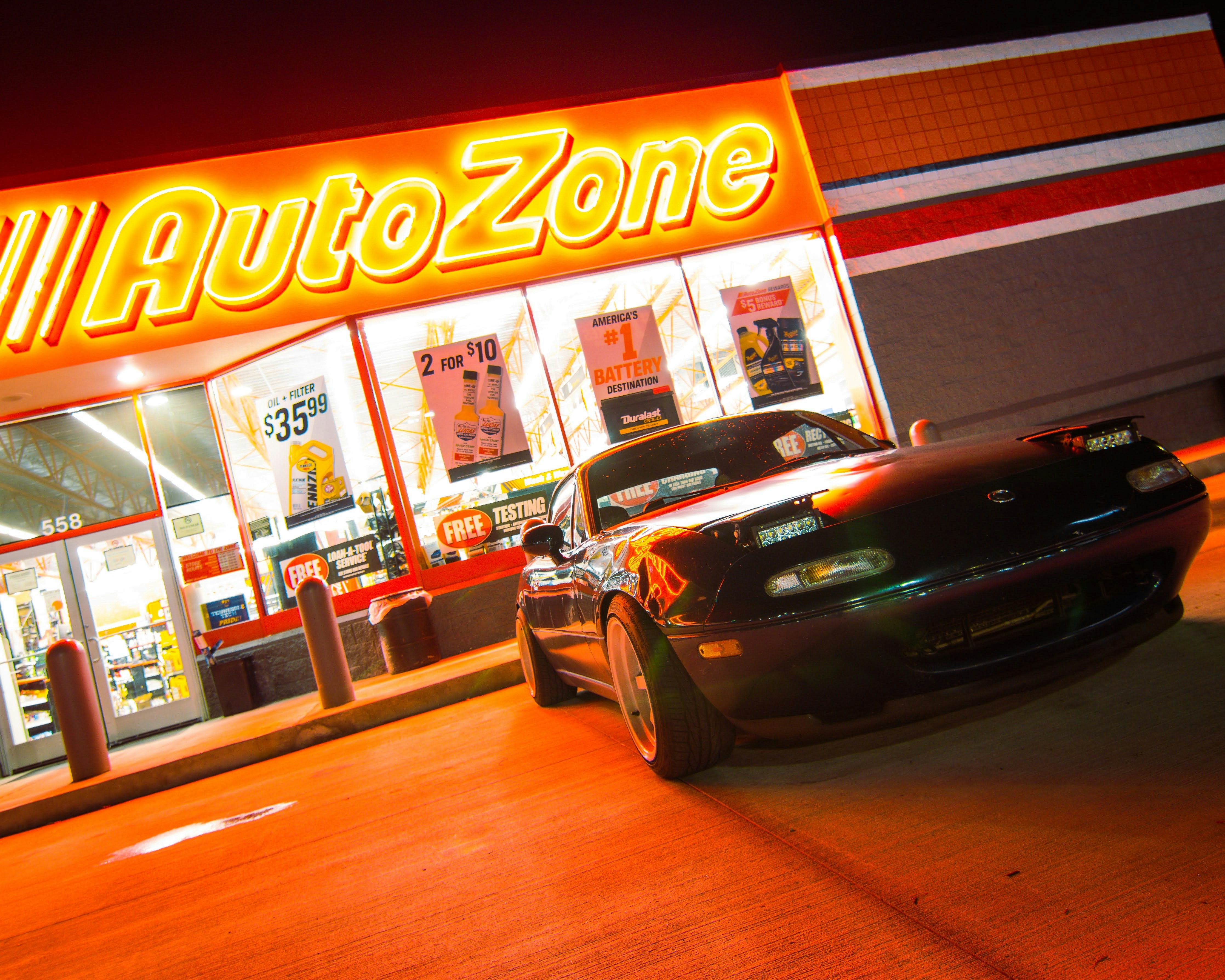 a car parked in front of a store