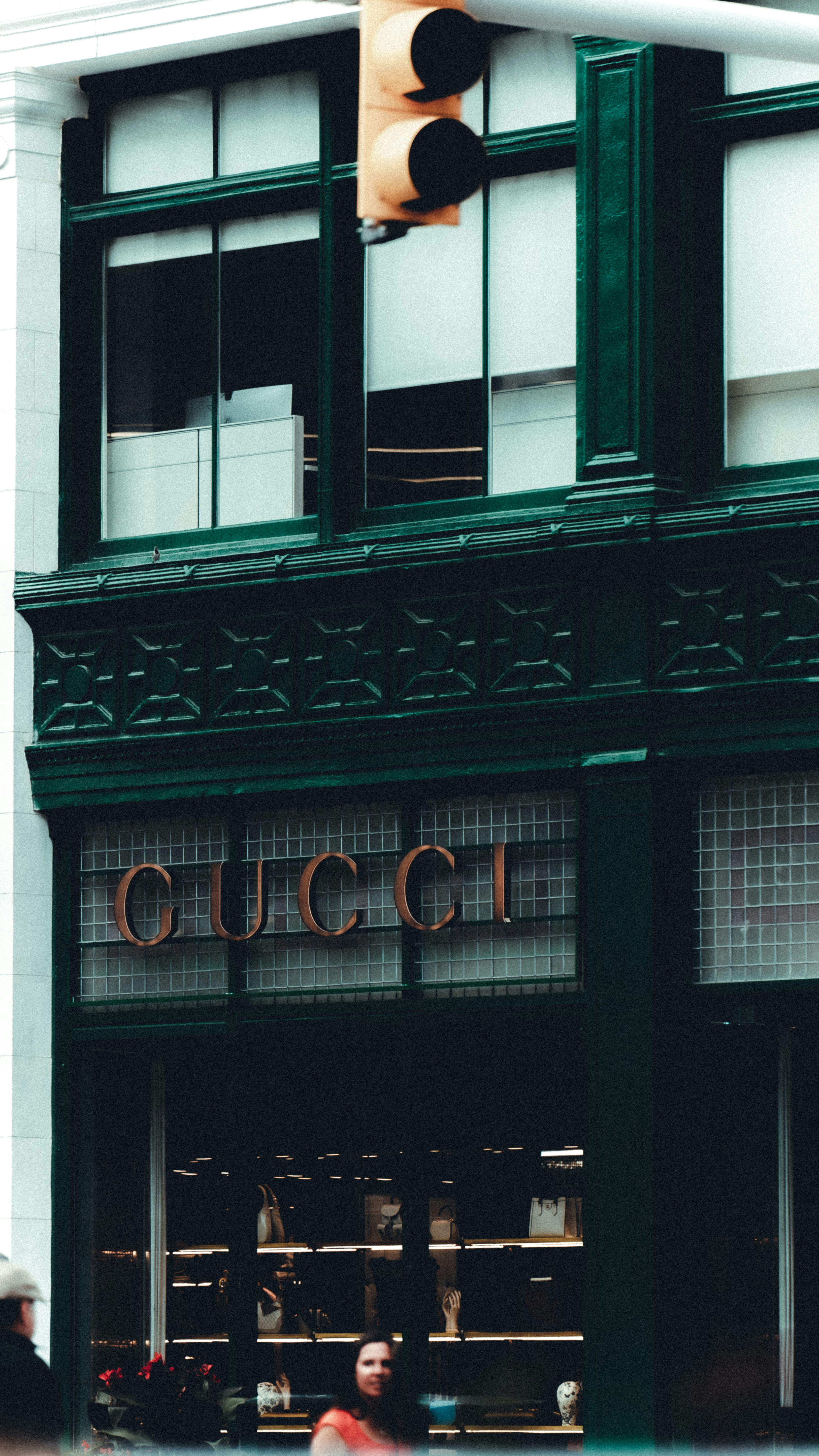 Emerald Facade, Golden Gucci: A City Street Portrait
