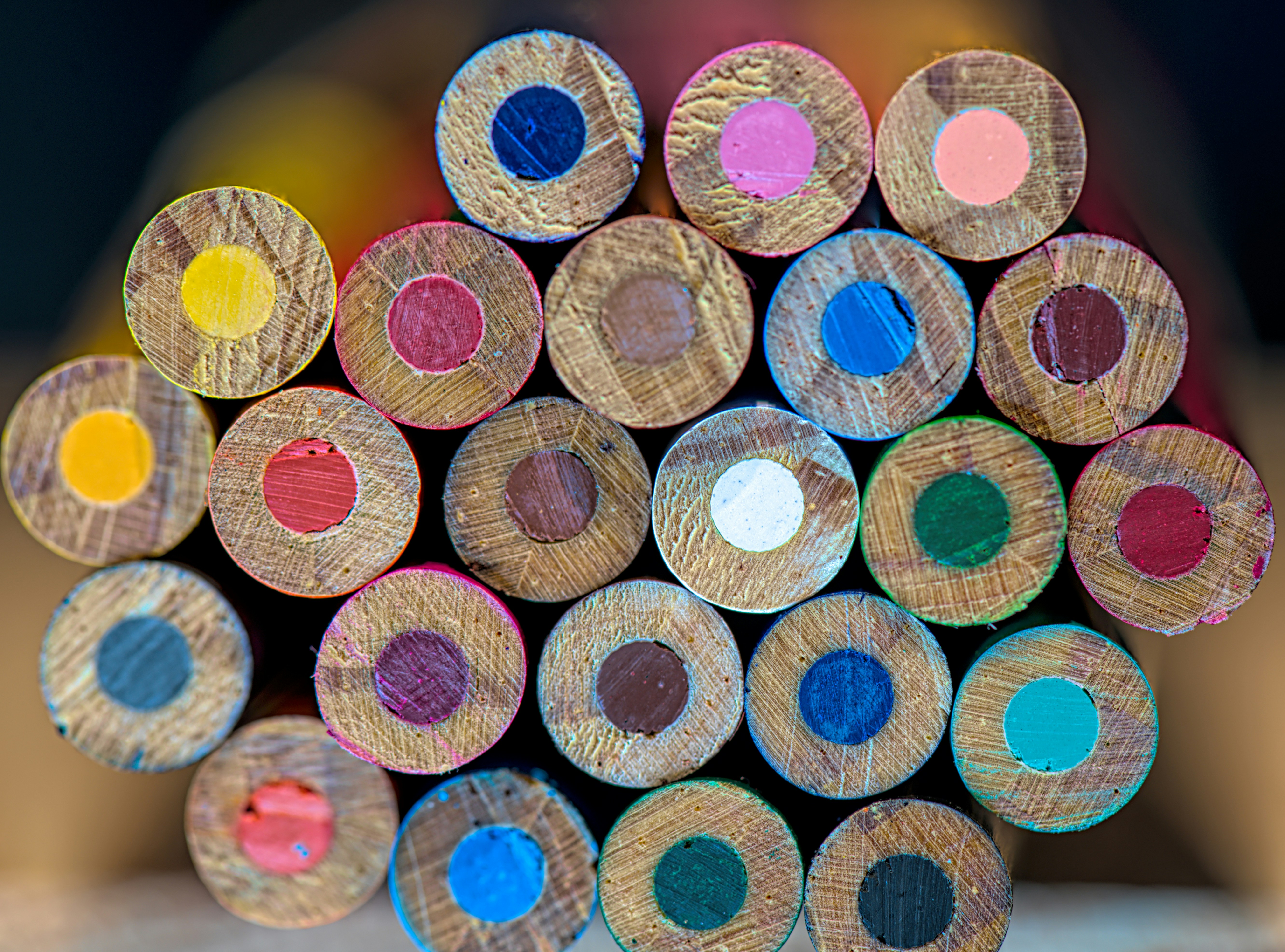 A group of circular objects photo – Free Wood pencils Image on Unsplash