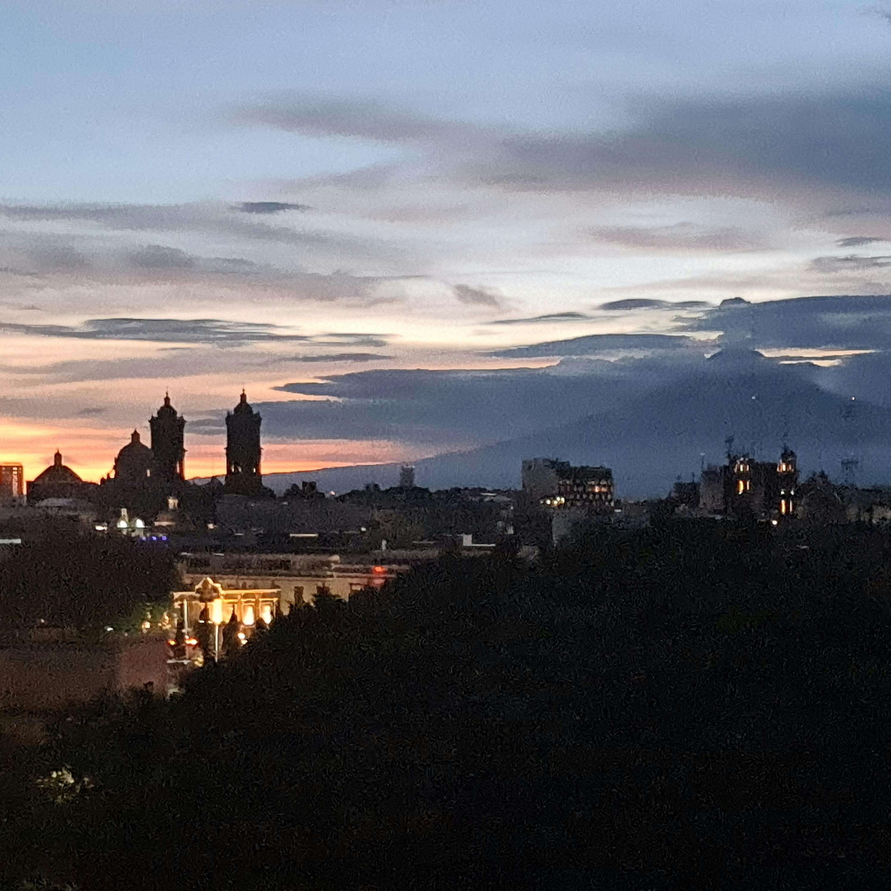 Dusk Over Twin Spires Along the Riverside