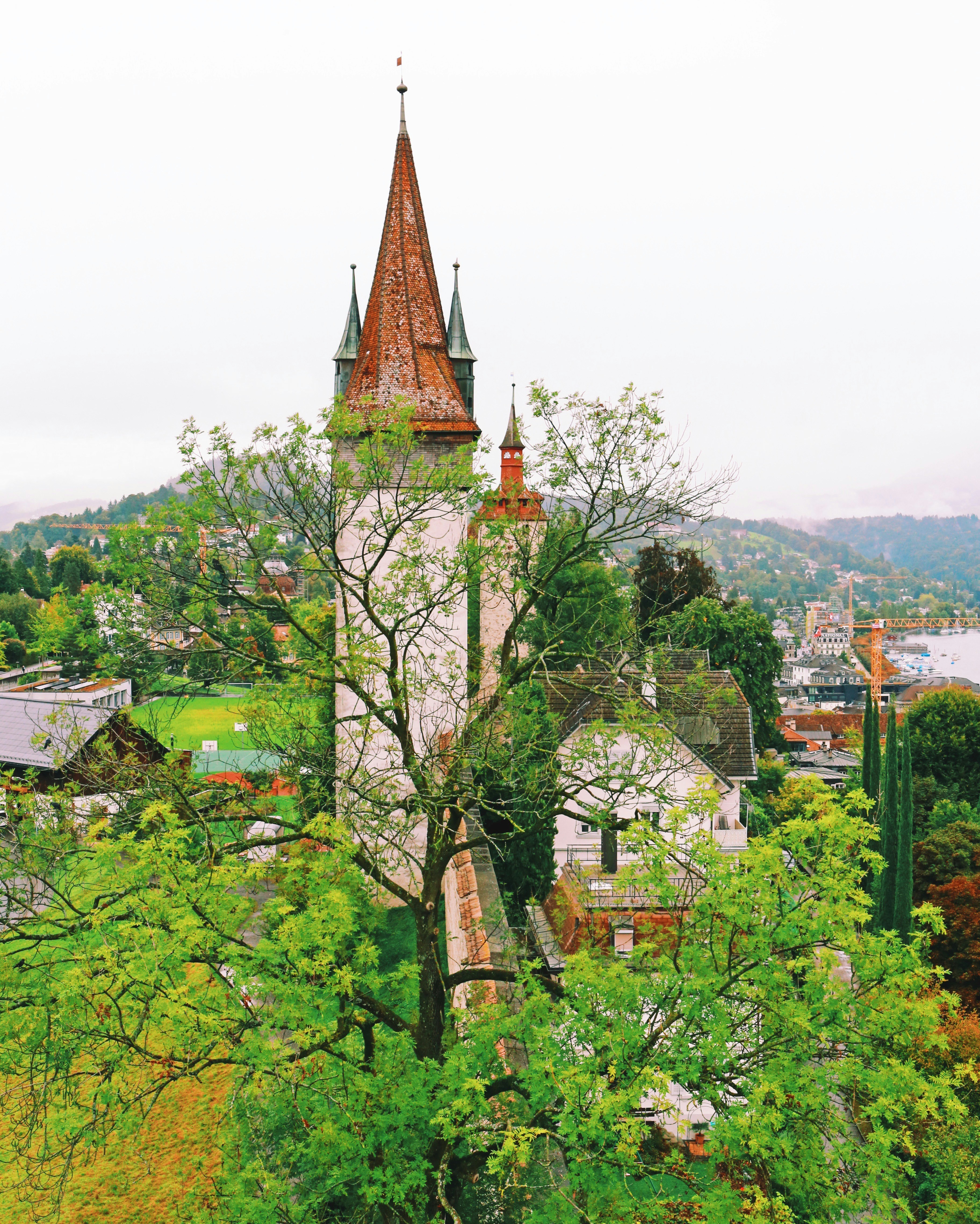 A tall building with pointy towers photo – Free Building Image on Unsplash