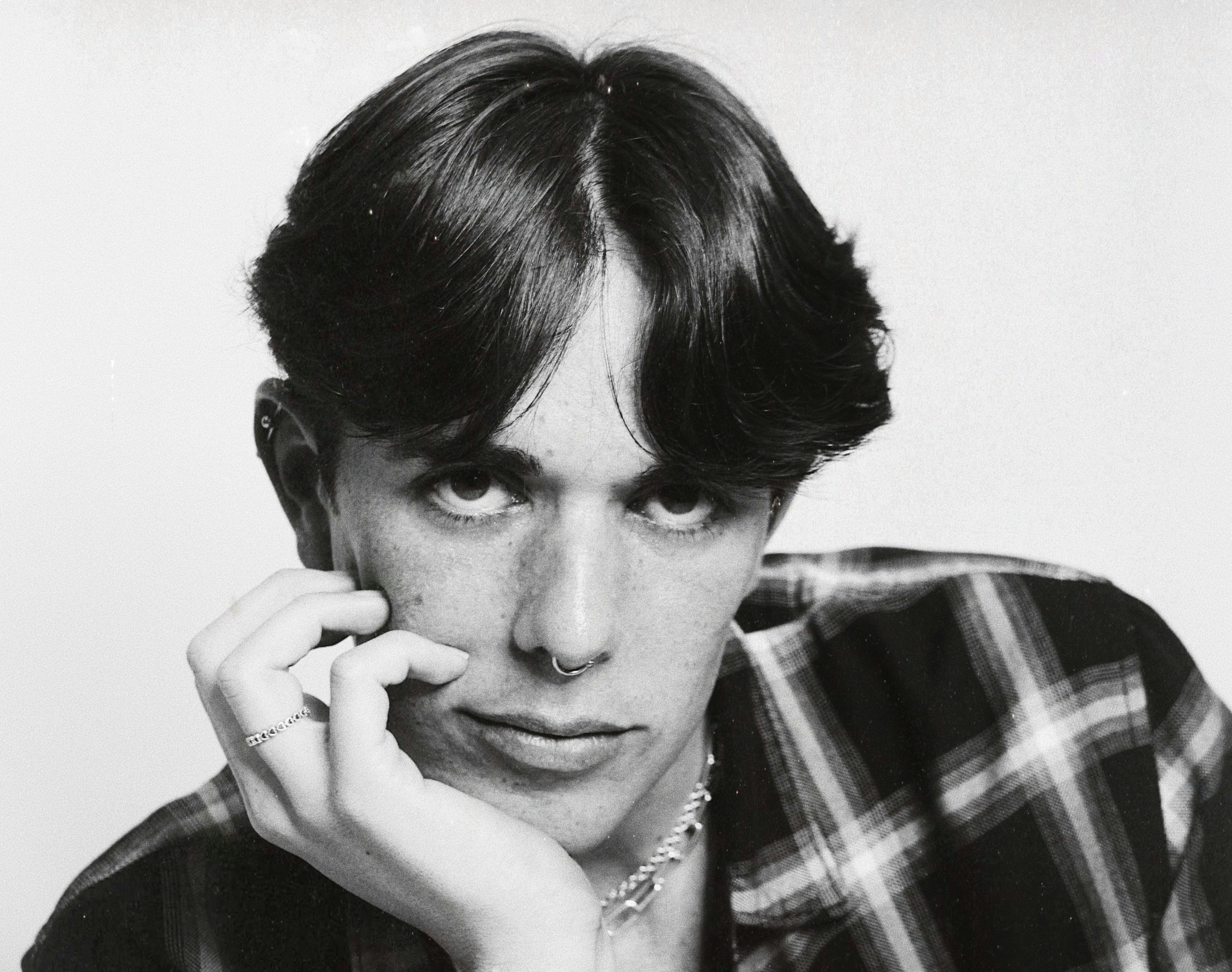 Monochrome Gaze: Quiet Rebellion in Plaid