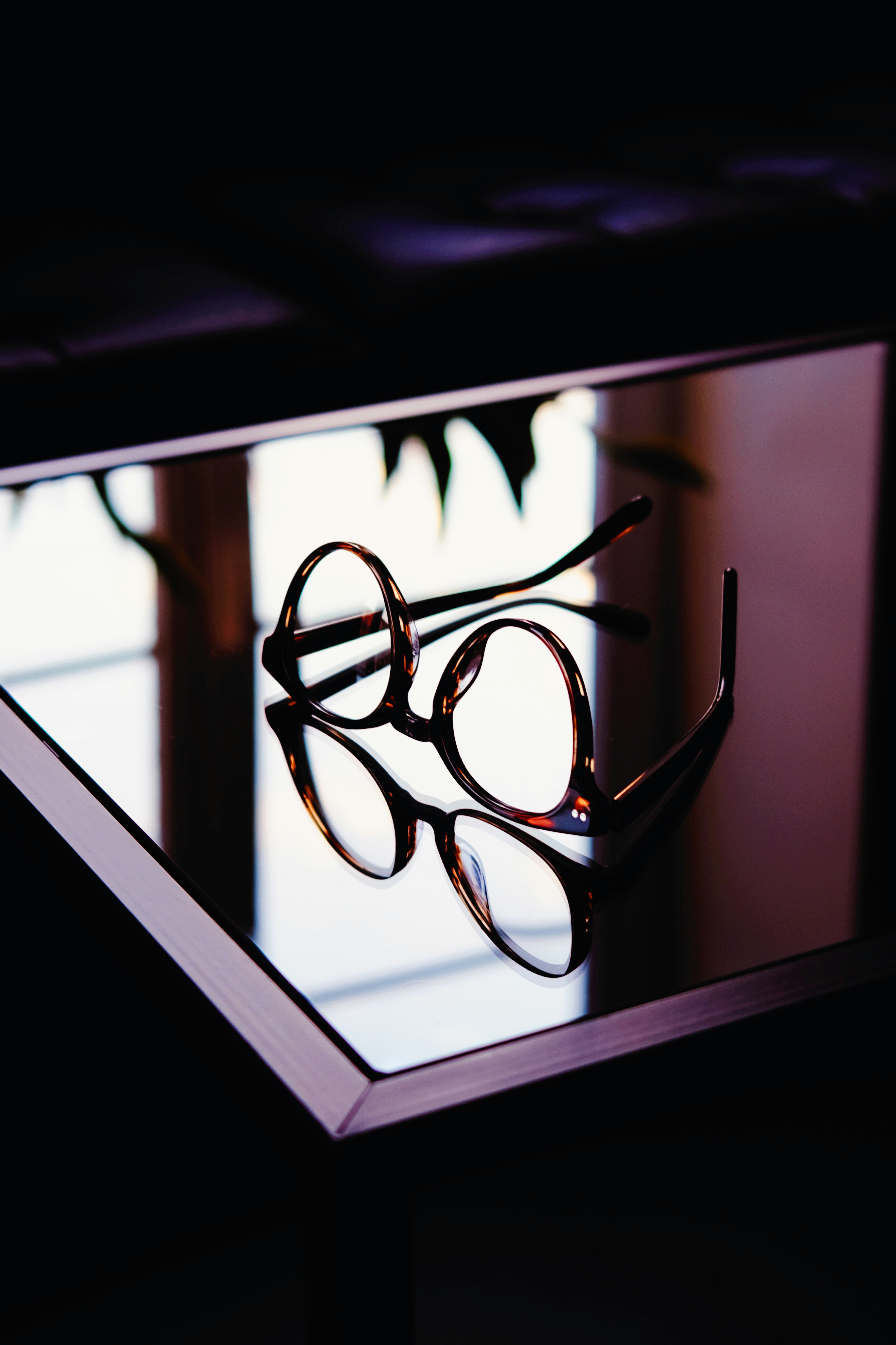 Glimmering Frames on a Midnight Mirror