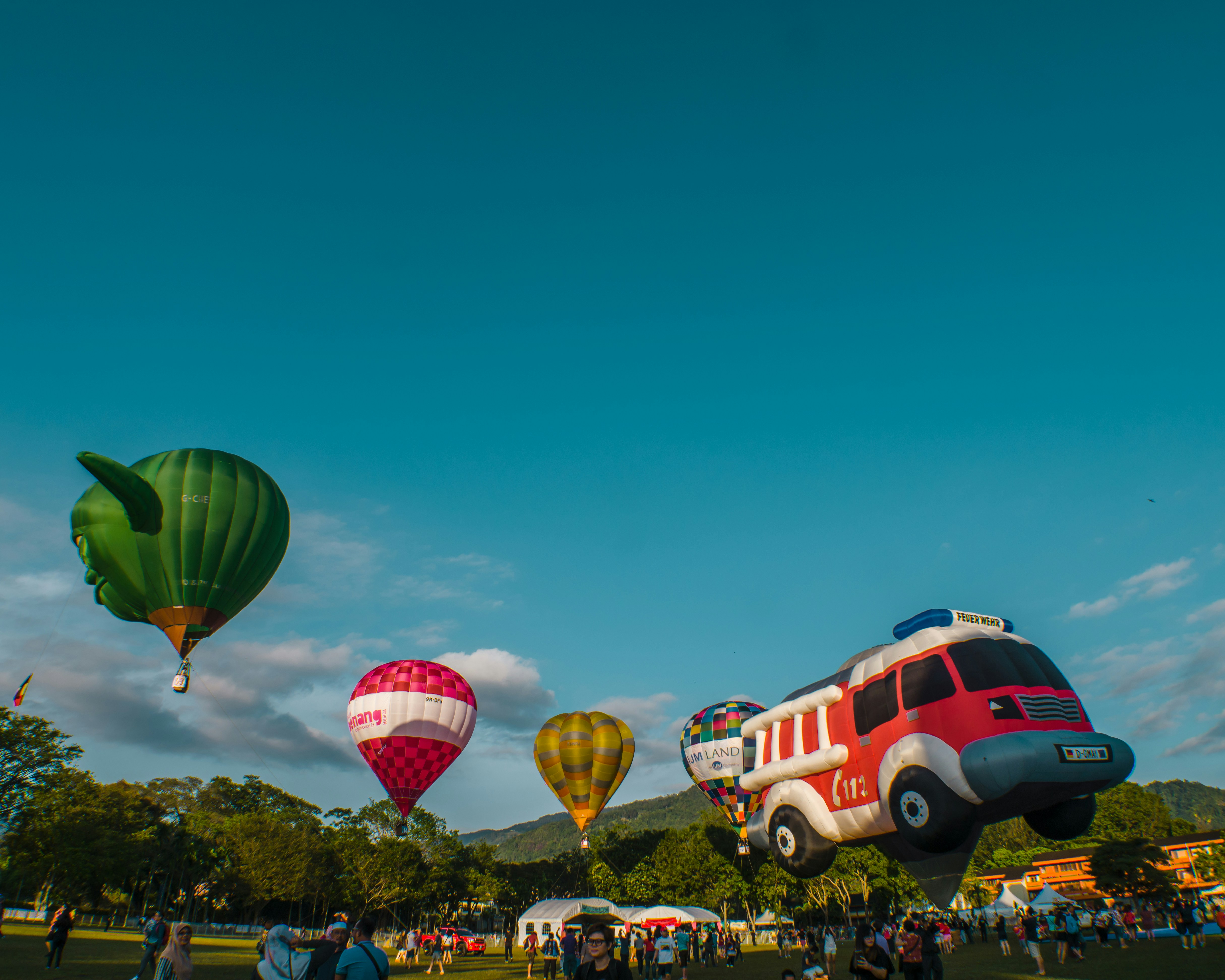 Front-Row Fire-Truck Balloon Leads a Sky Full of Floating Balloons