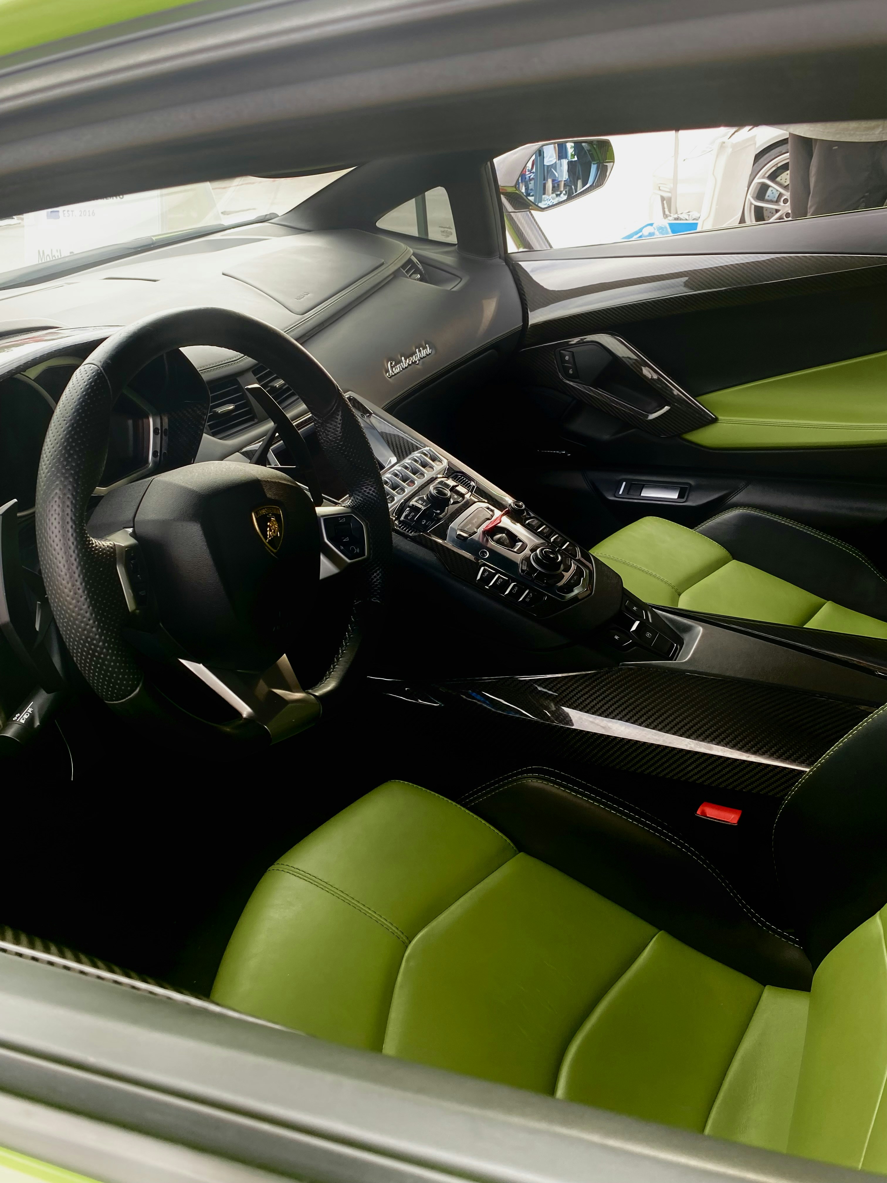 Verdant Cockpit: Lime Leather and Carbon Fiber in a Lamborghini Interior