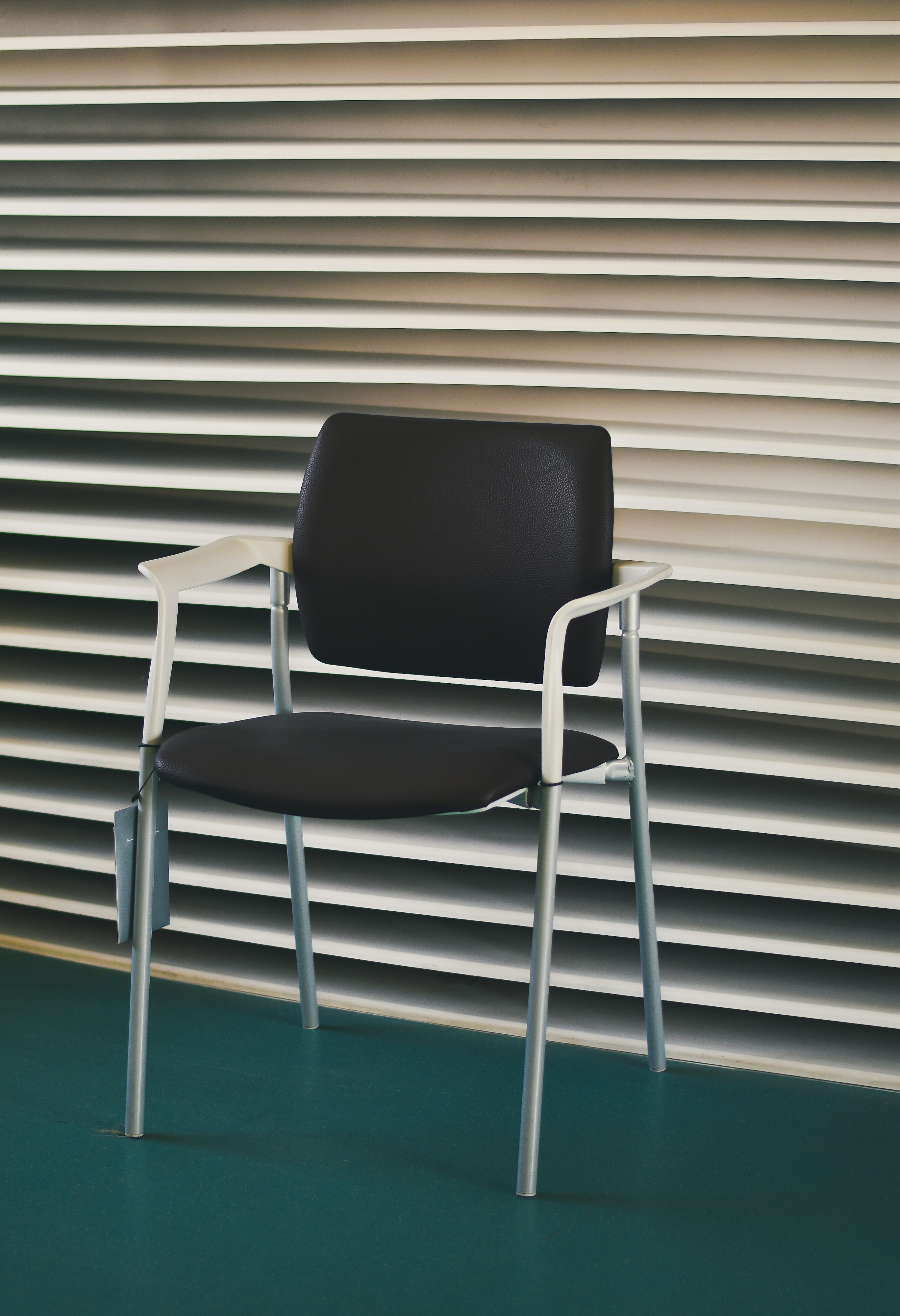 A chair in front of a wall photo – Free Chair Image on Unsplash