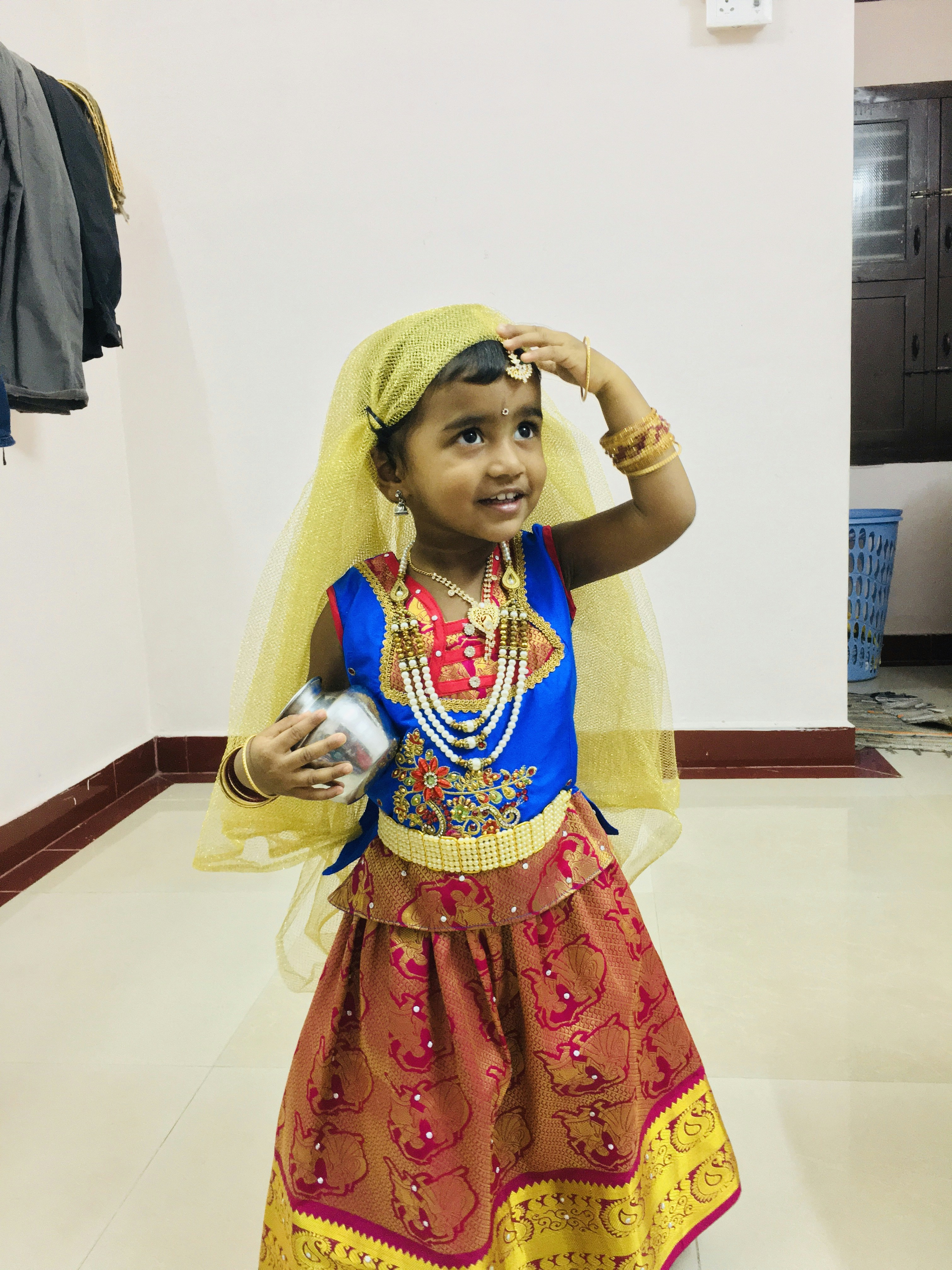 Tiny Festival Queen in a Bright Indoor Portrait