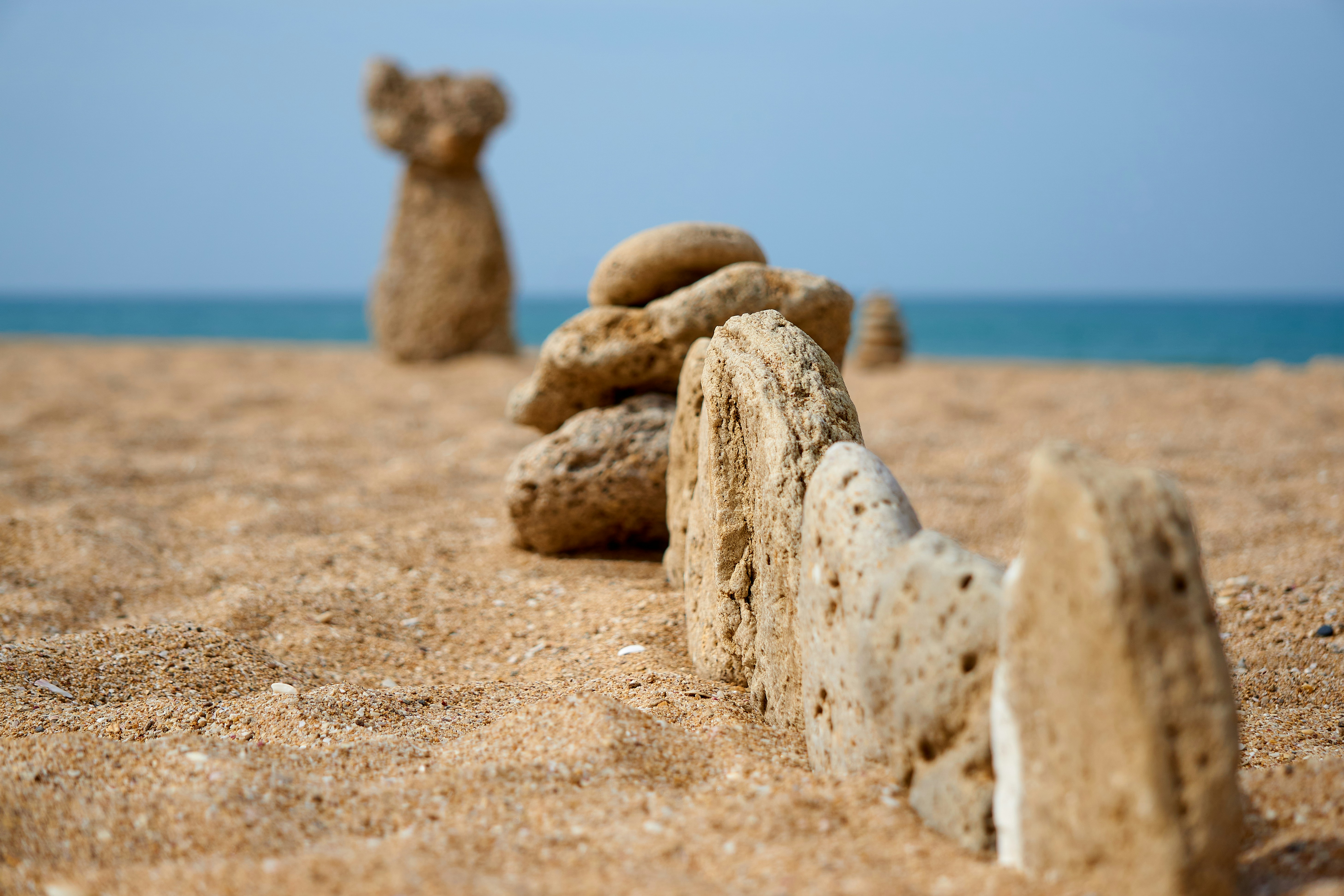a group of rocks on a beach