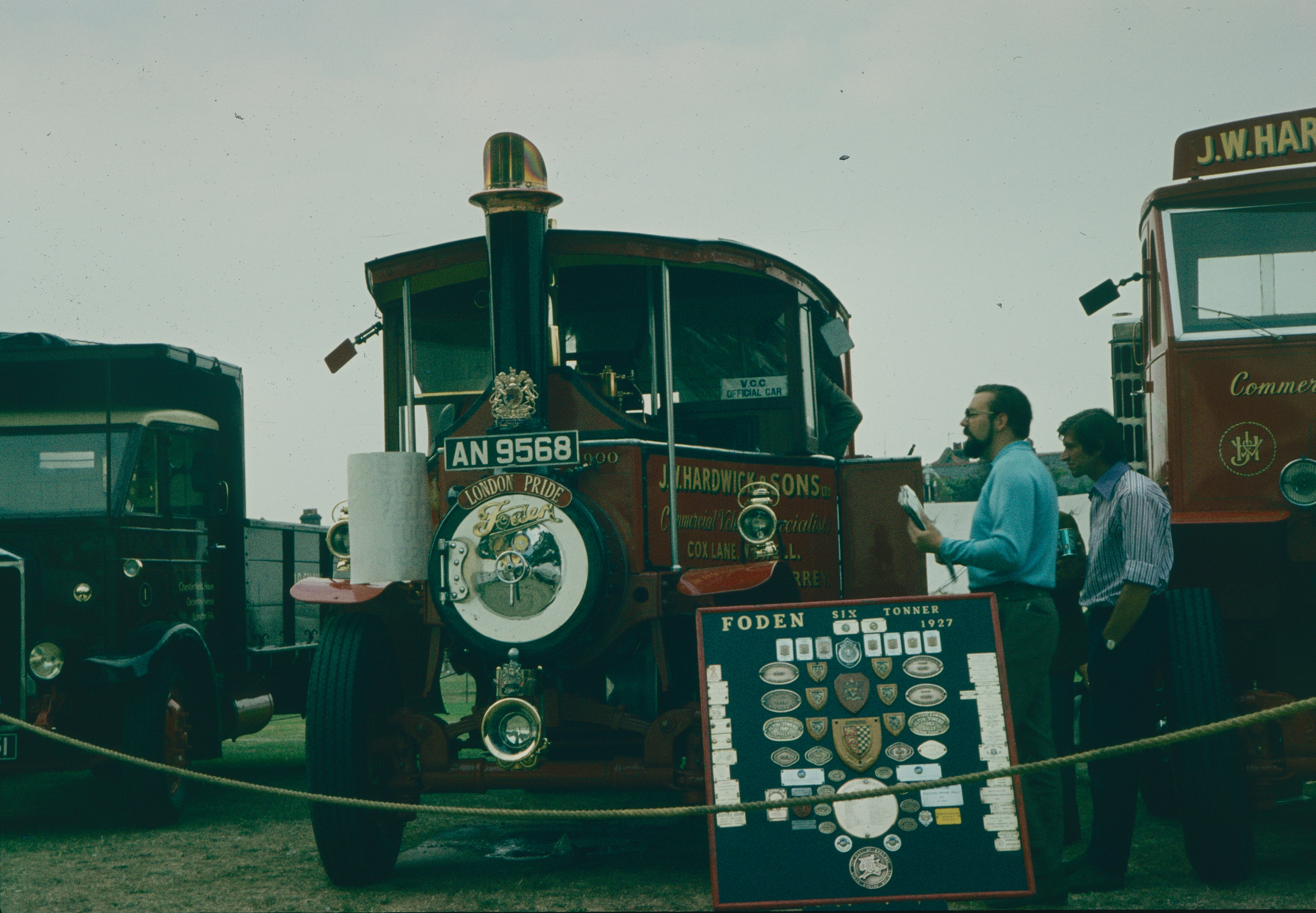 A tractor with a sign photo – Free Bus museum Image on Unsplash
