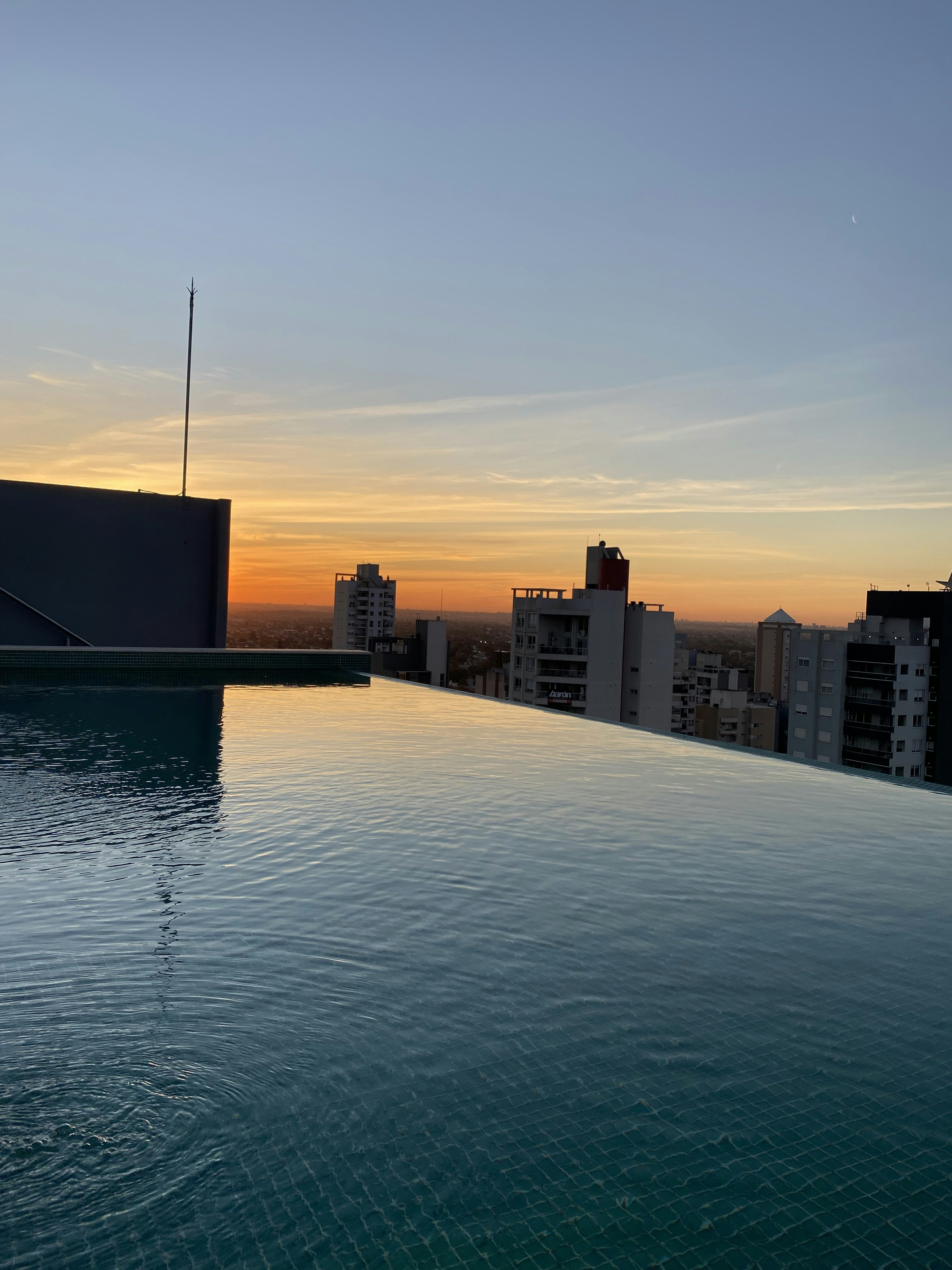 A body of water with buildings along it photo – Free Building Image on ...