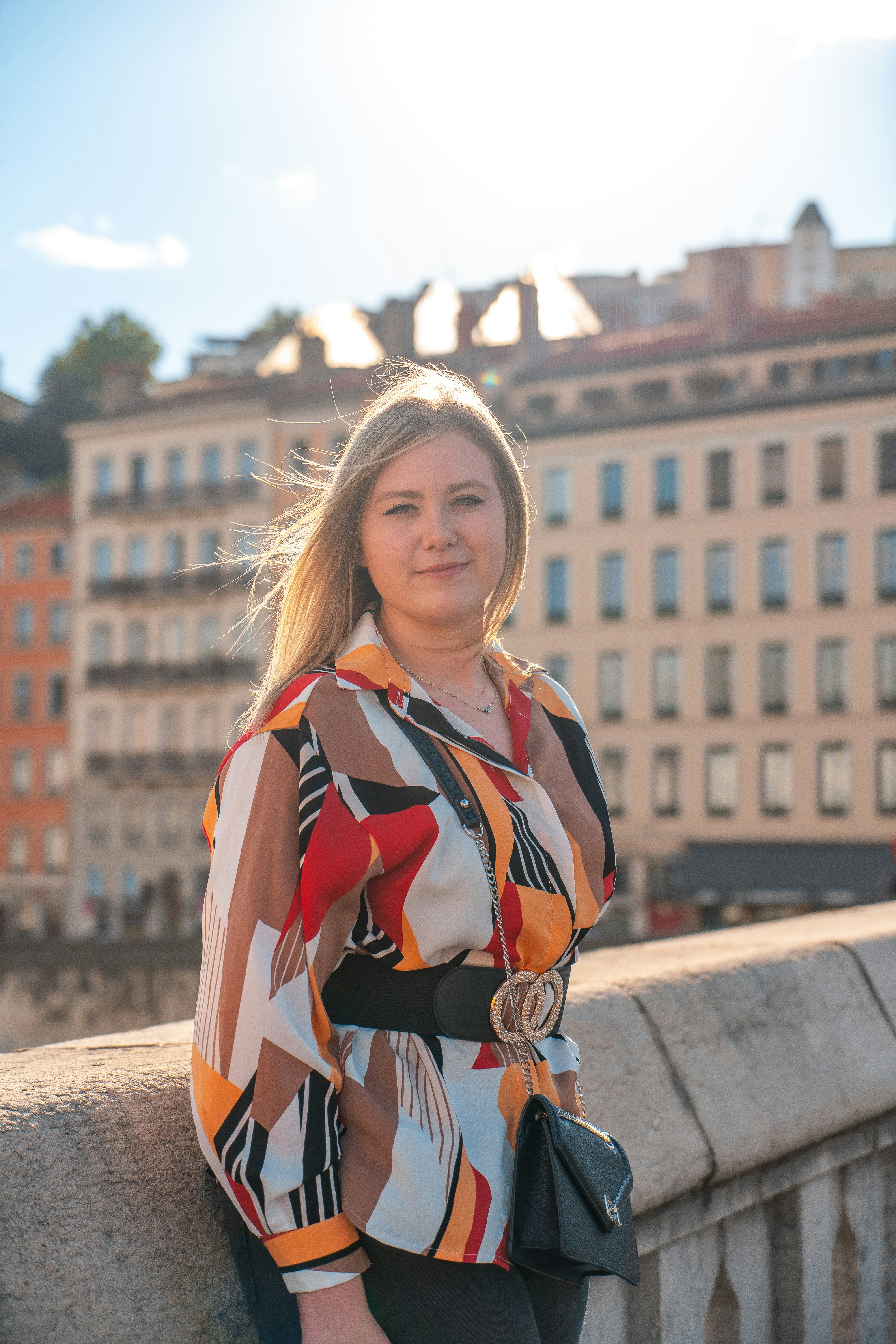 Sunlit Street Portrait in Colorful Urban Dress