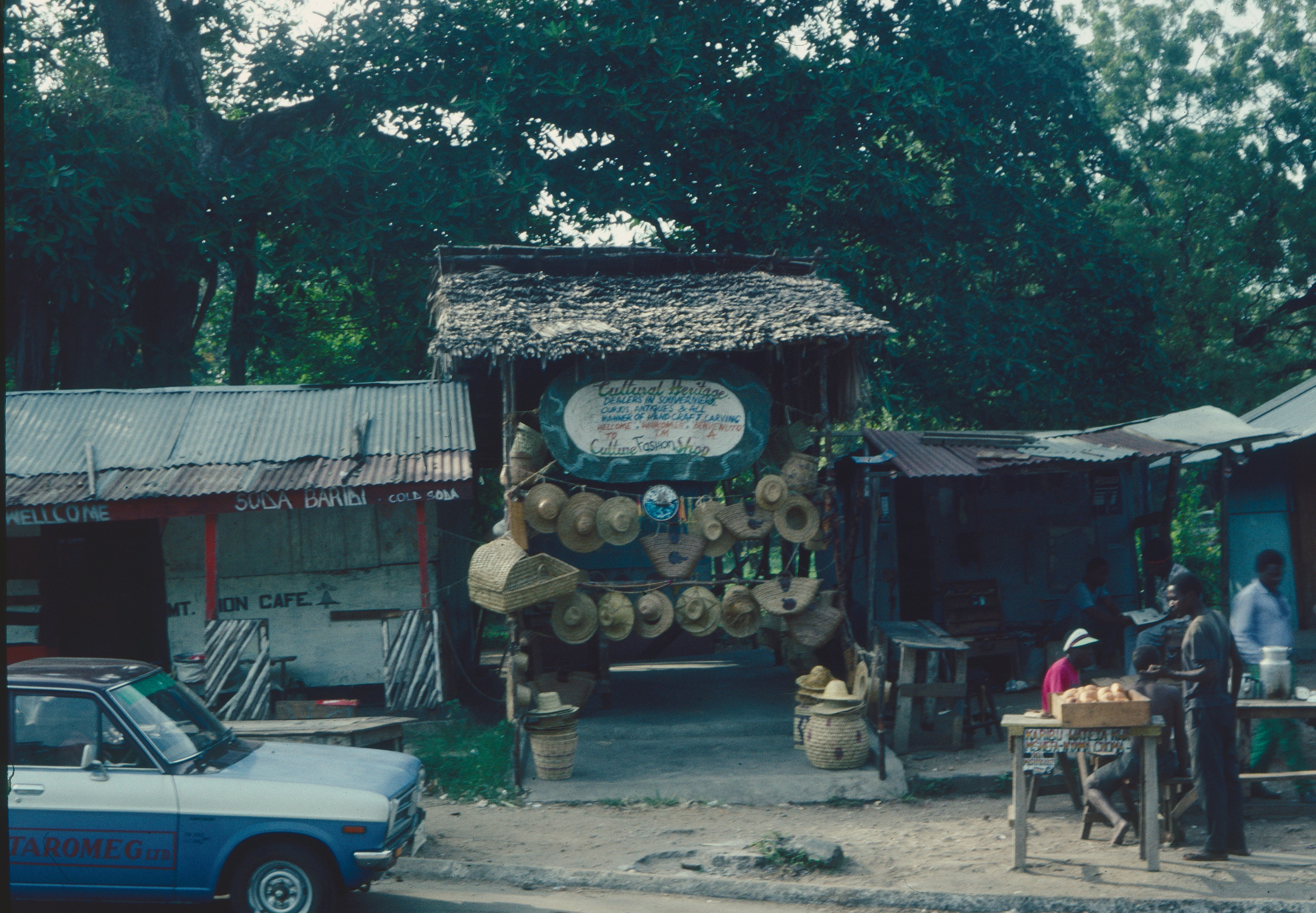 a small shop with a sign