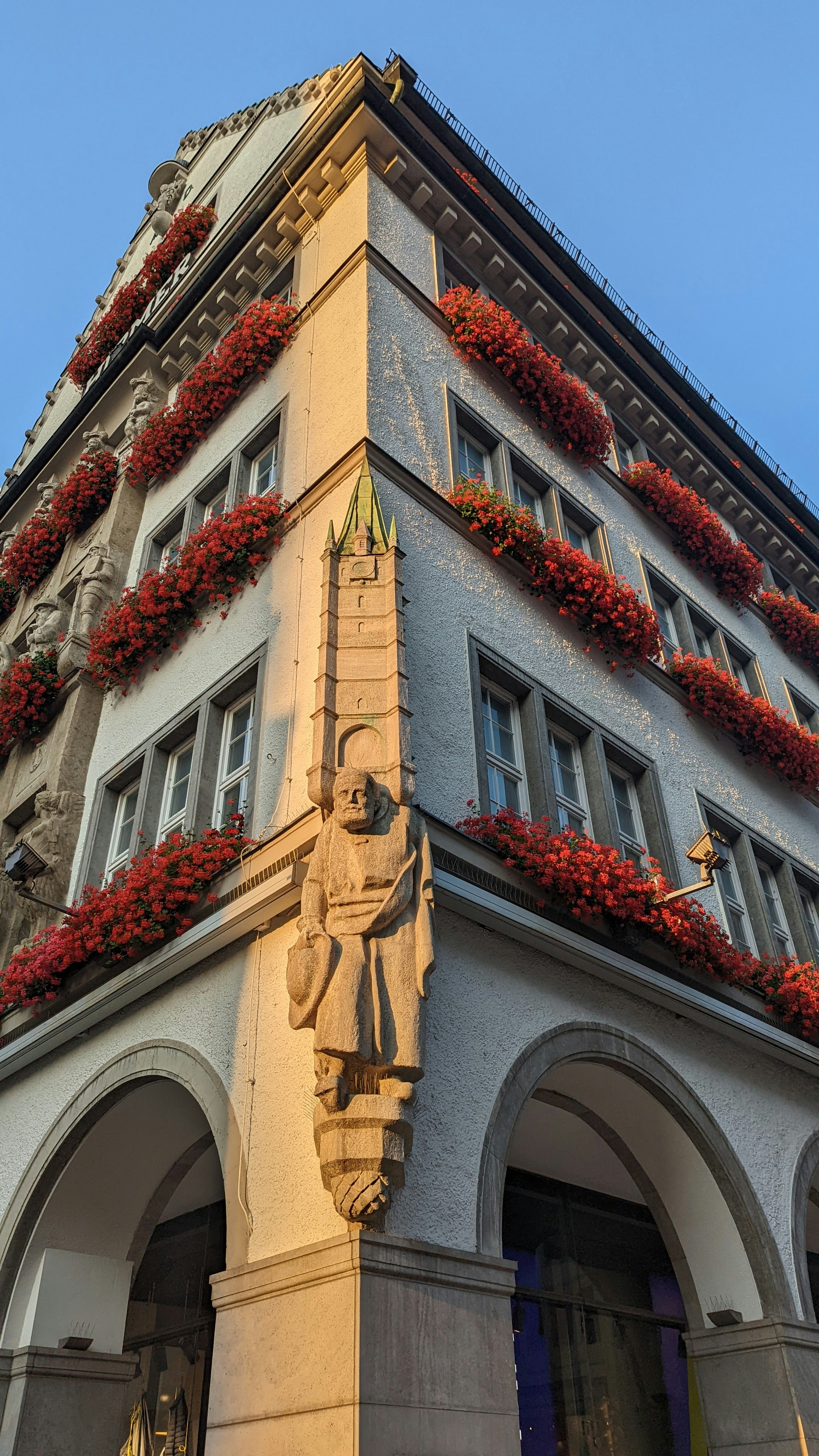 Cornered Guardian: A Facade Dressed in Crimson Blooms