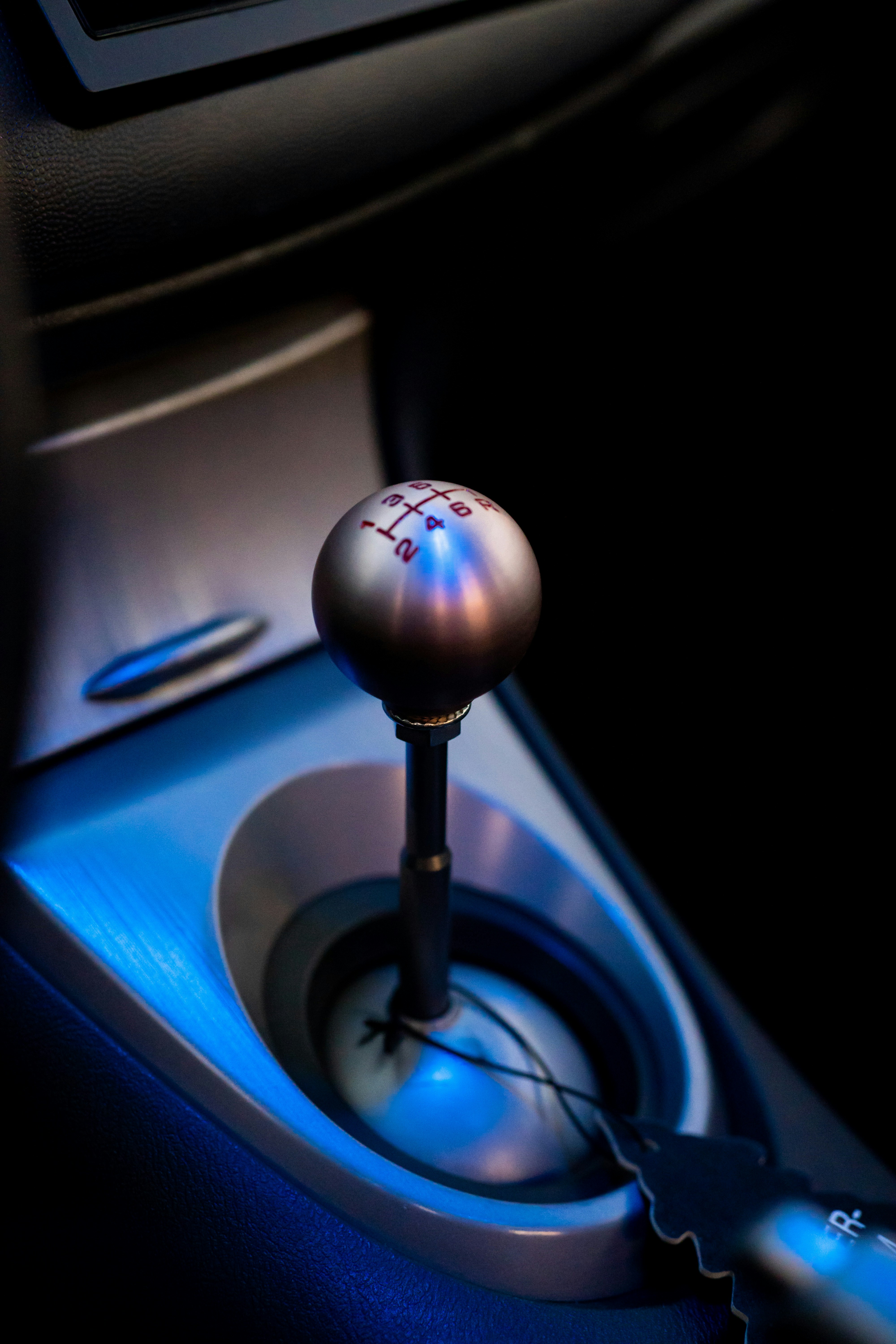 Midnight Shift: Neon Blue Gear Knob Close-Up